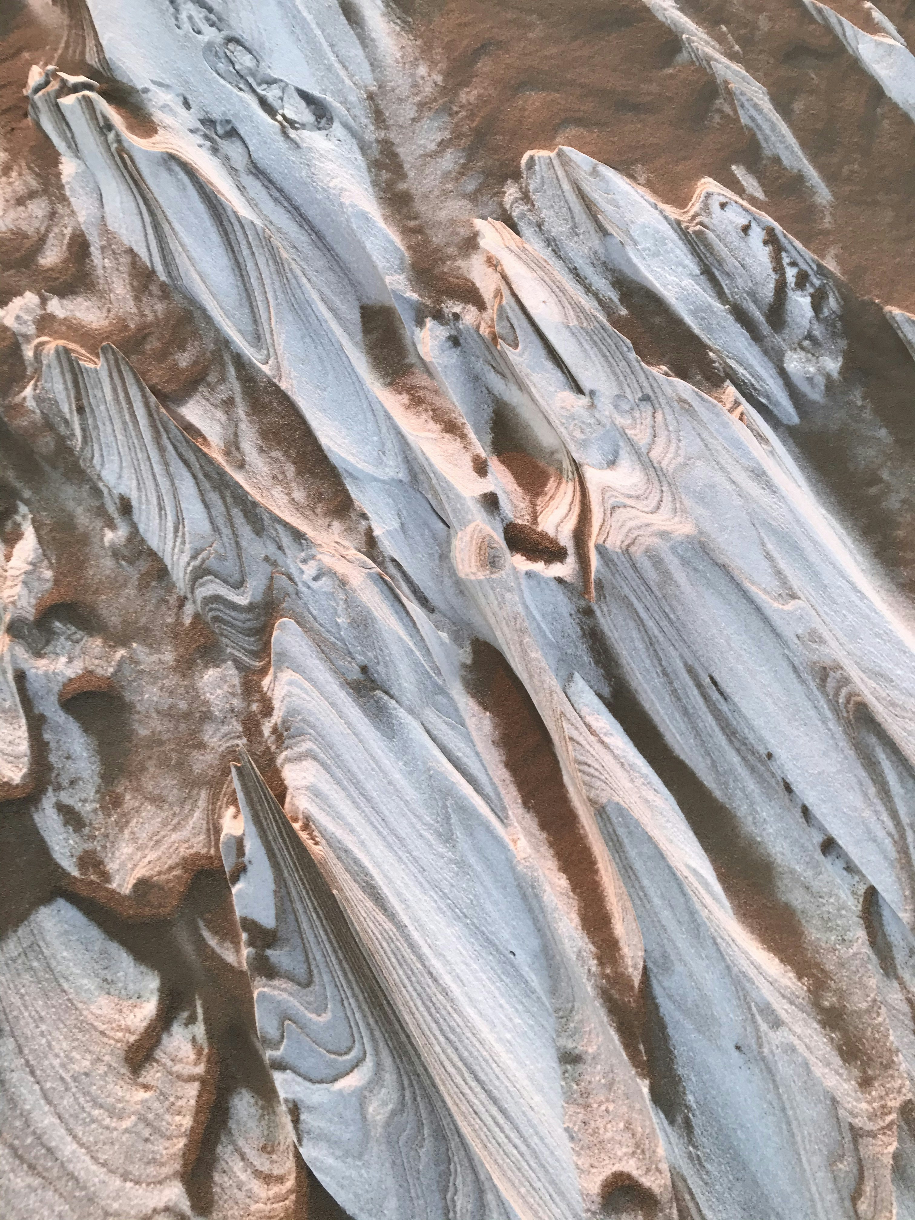 Ridgework in Frost: Aerial Study of Blue-Gray Striations