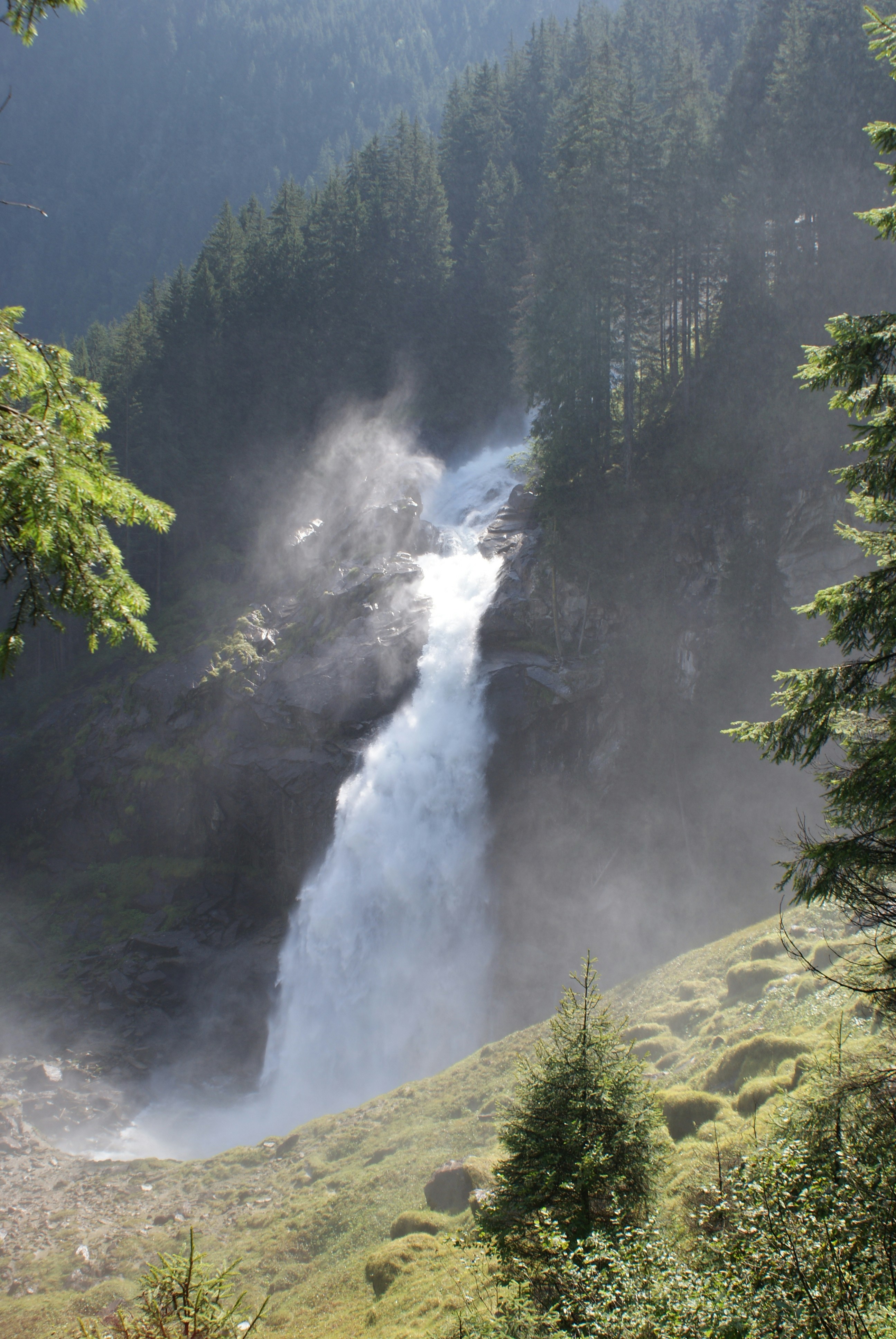 A waterfall in the middle of a forest photo – Free Oostenrijk Image on ...