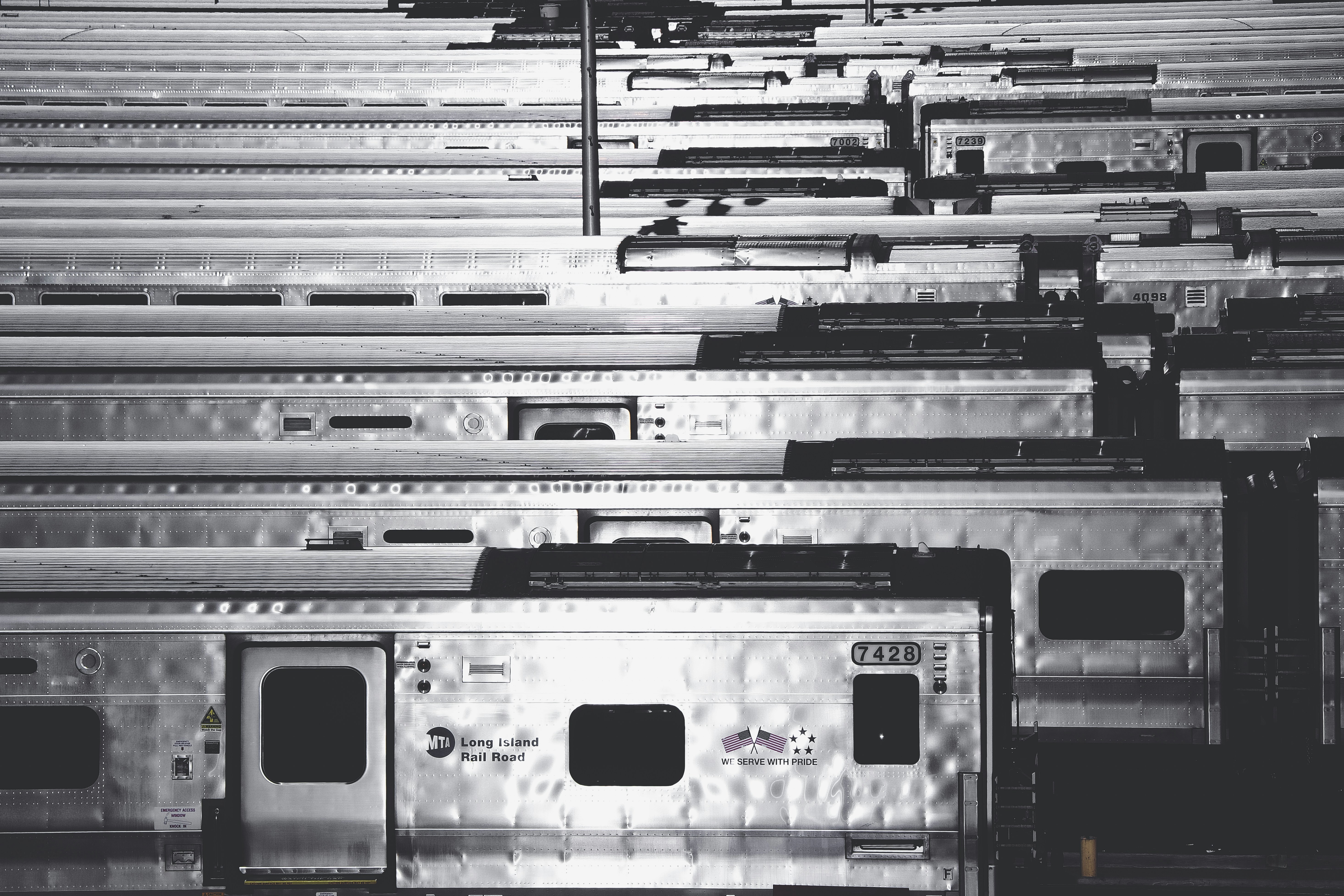 Monochrome Rails: A Regiment of Weathered Train Cars