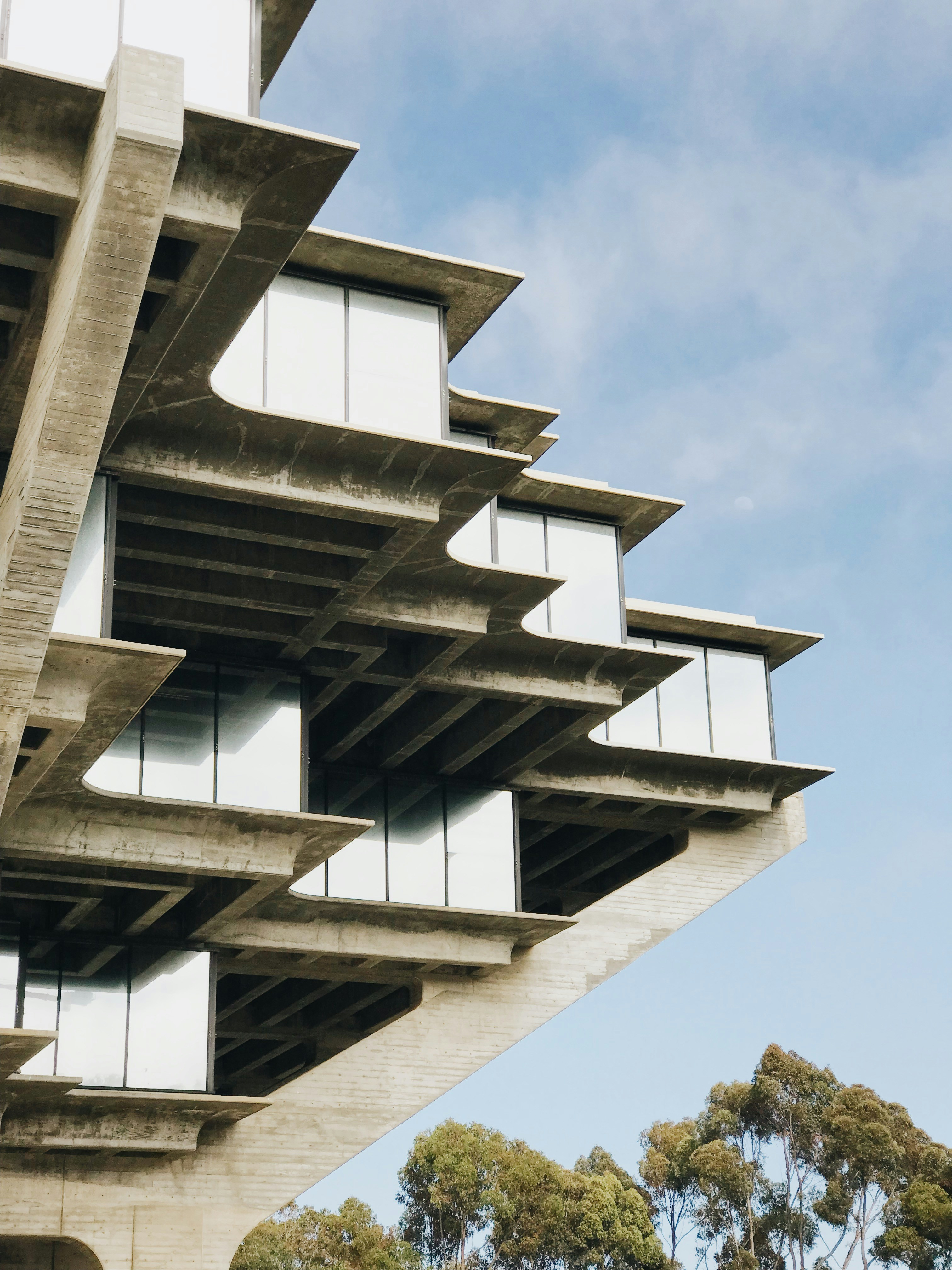 Stacked Concrete Cantilevers: Aerial Slices of Brutalist Geometry