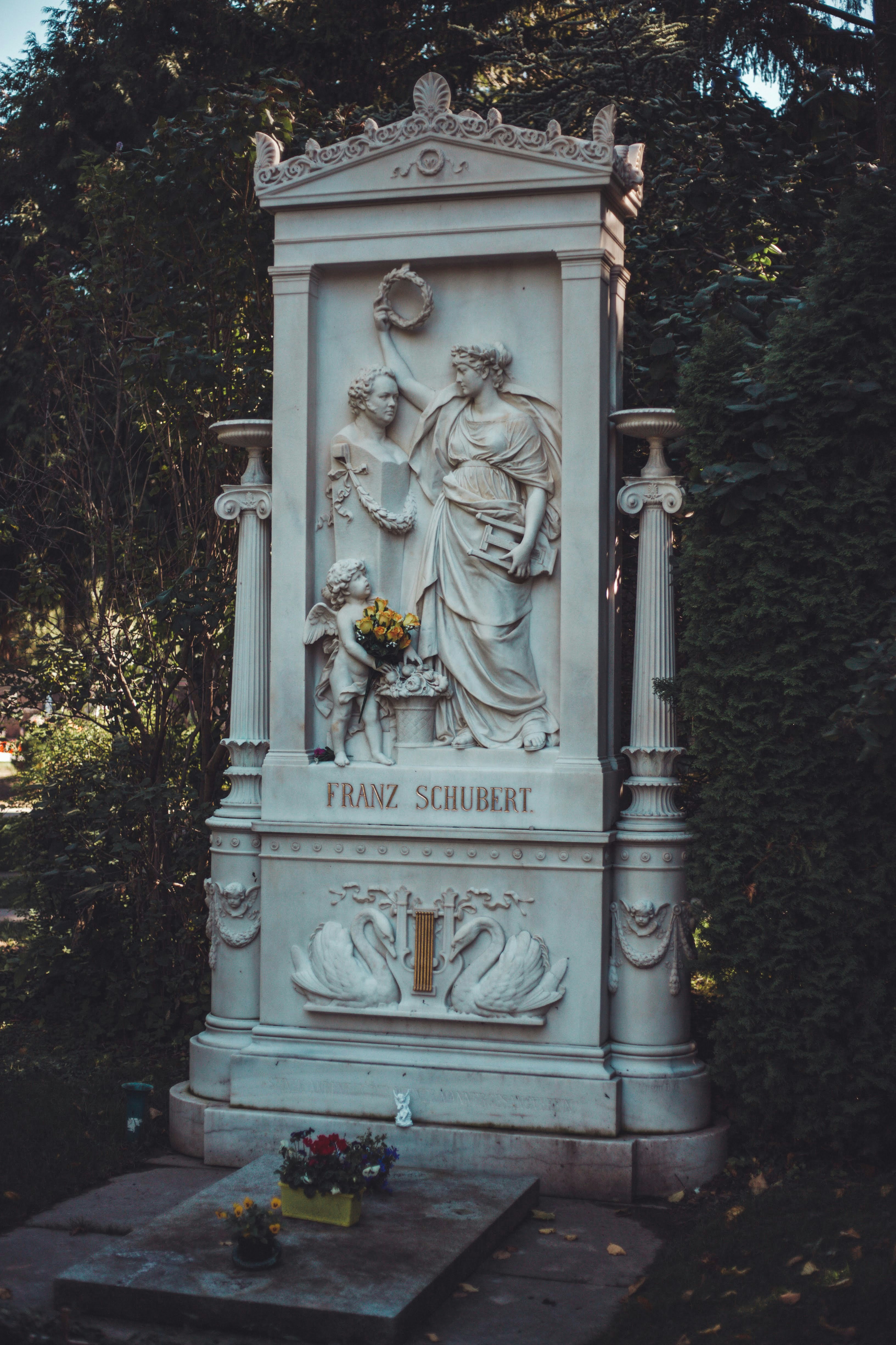 Stone Allegory: Franz Schubert Monument in a Quiet Garden
