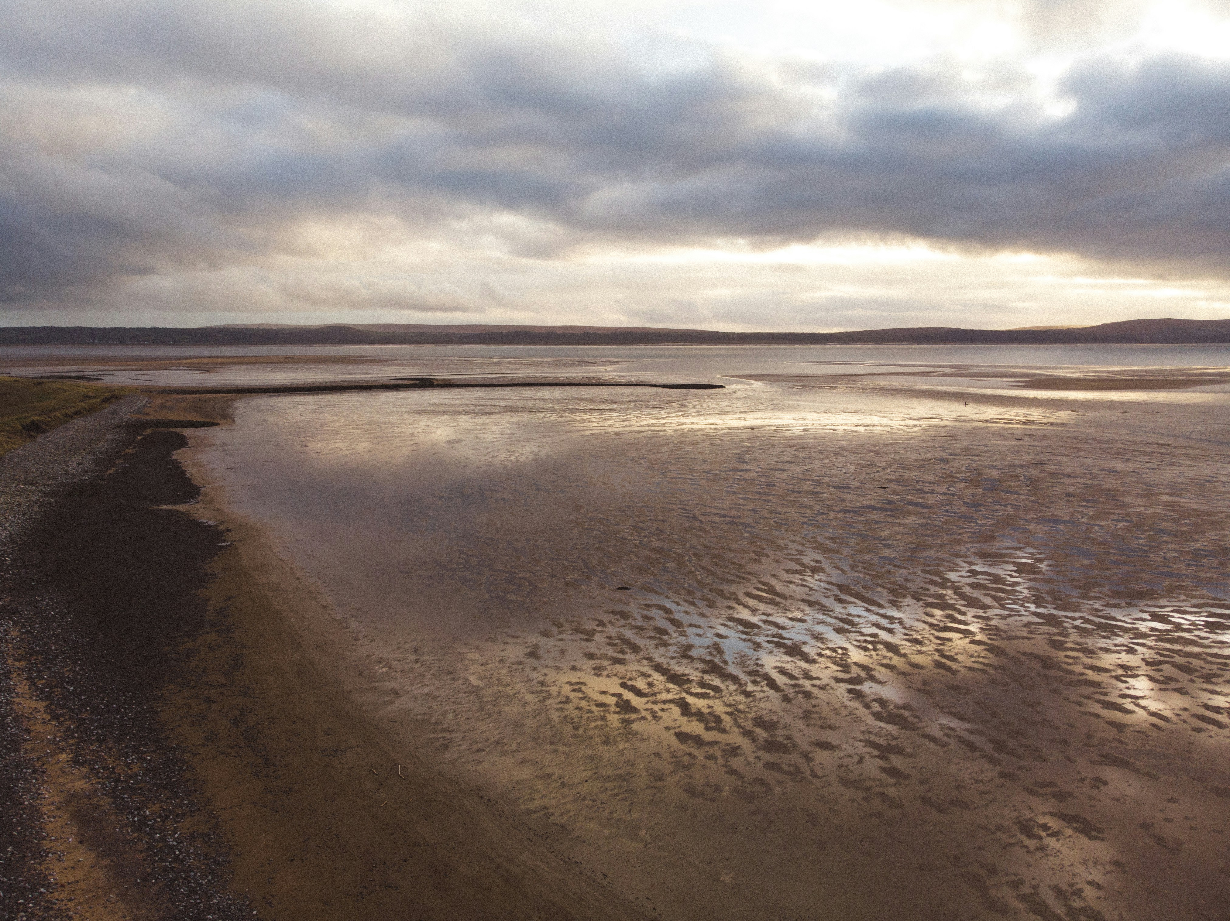 Dusk Reflections Across a Quiet Tidal Plain