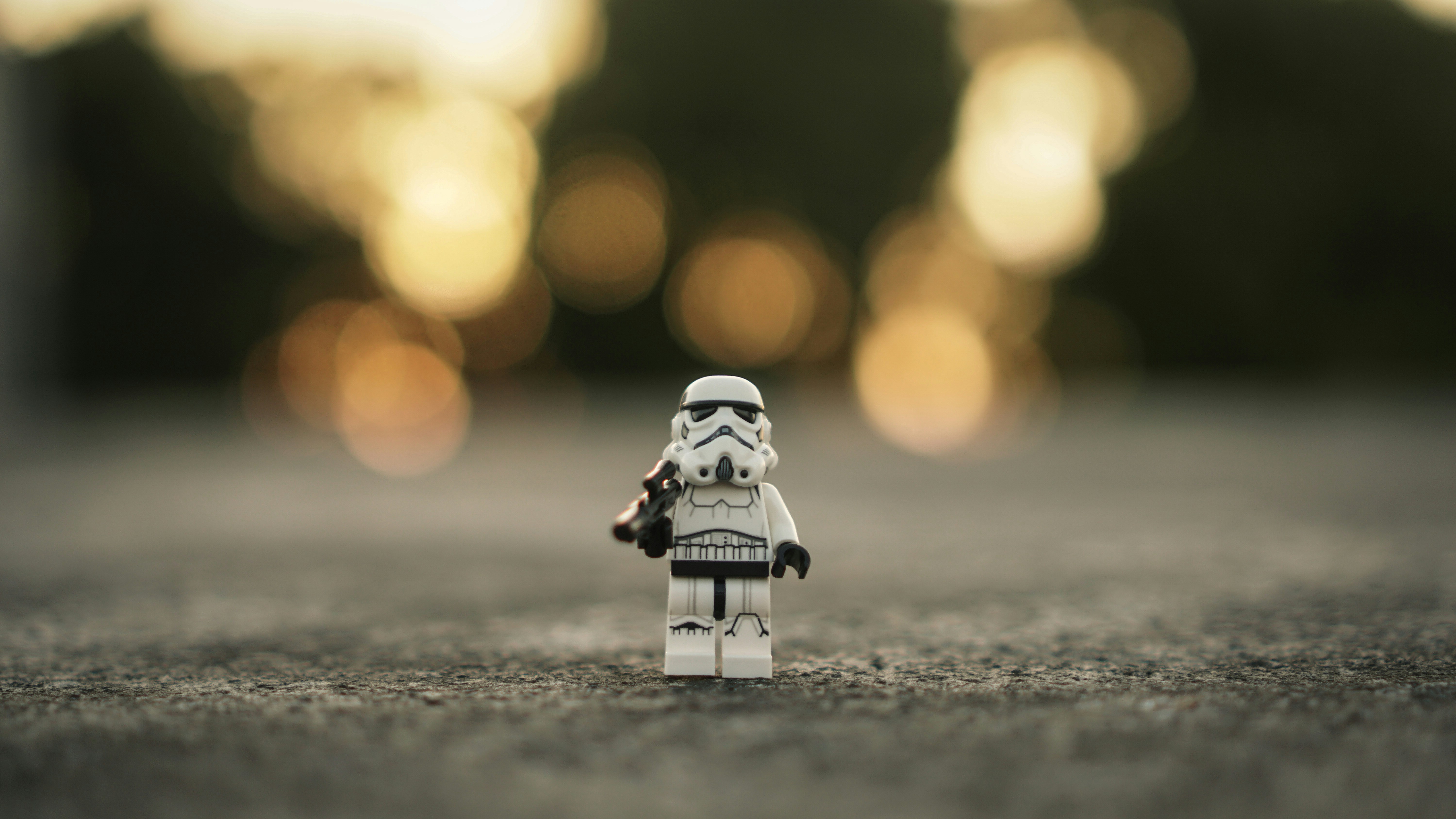 A lego star wars trooper standing in the middle of a road photo – Free ...
