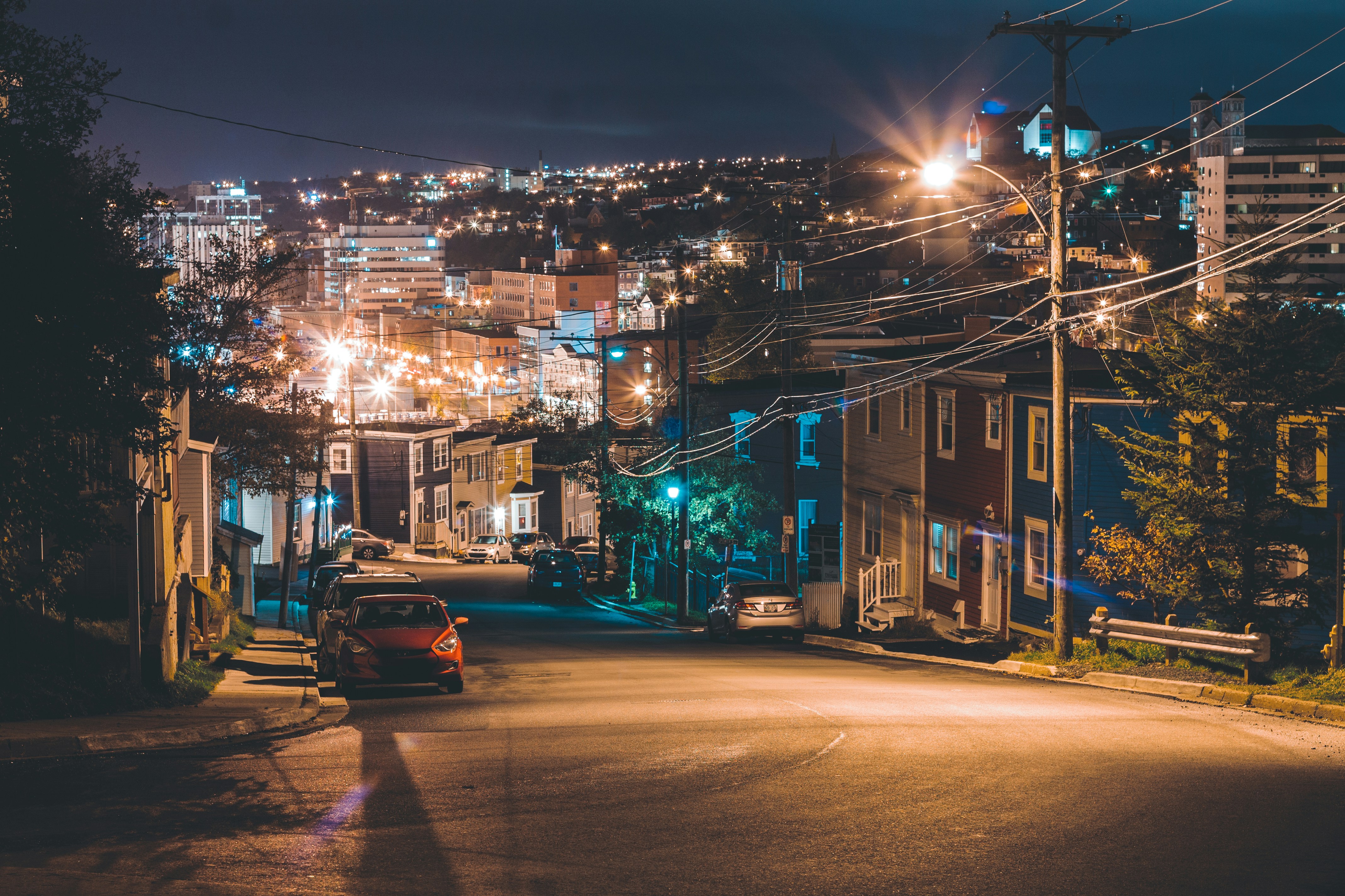 Parked vehicles beside street photo – Free Car Image on Unsplash