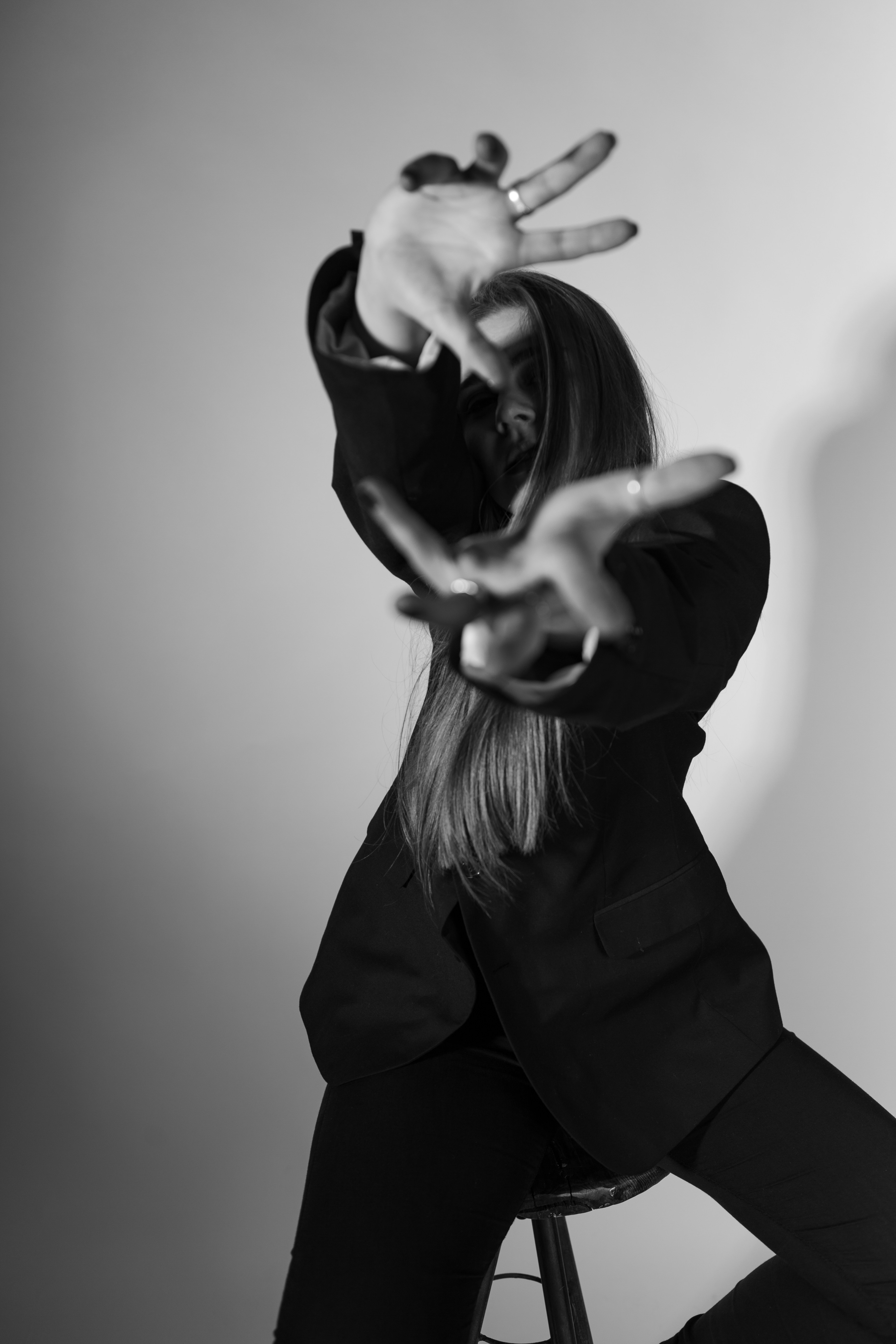 Grayscale photo of person lifting hands photo – Free Grey Image on Unsplash