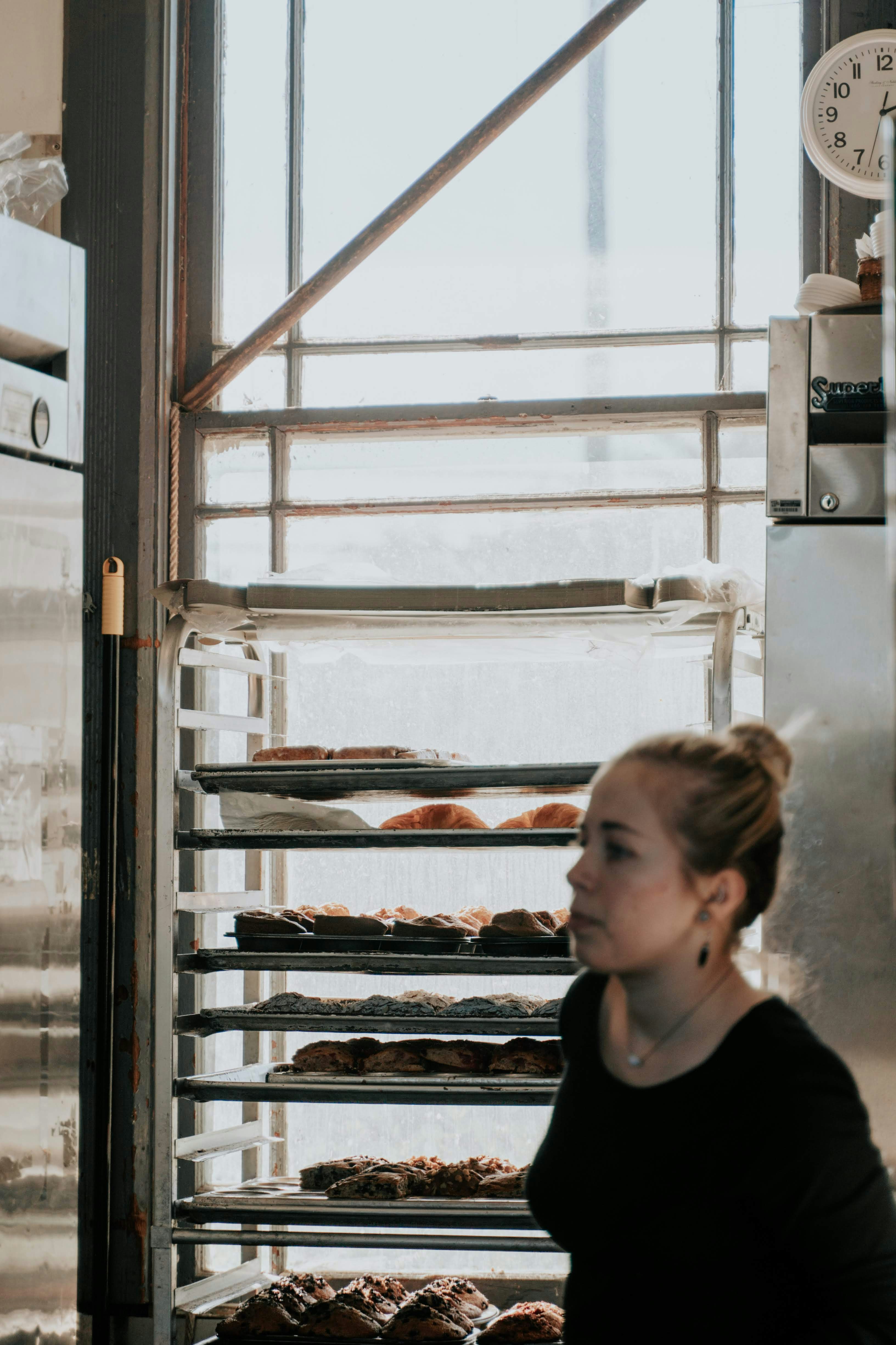 Morning Row of Pastries Under Glass: A Quiet Bakery Moment