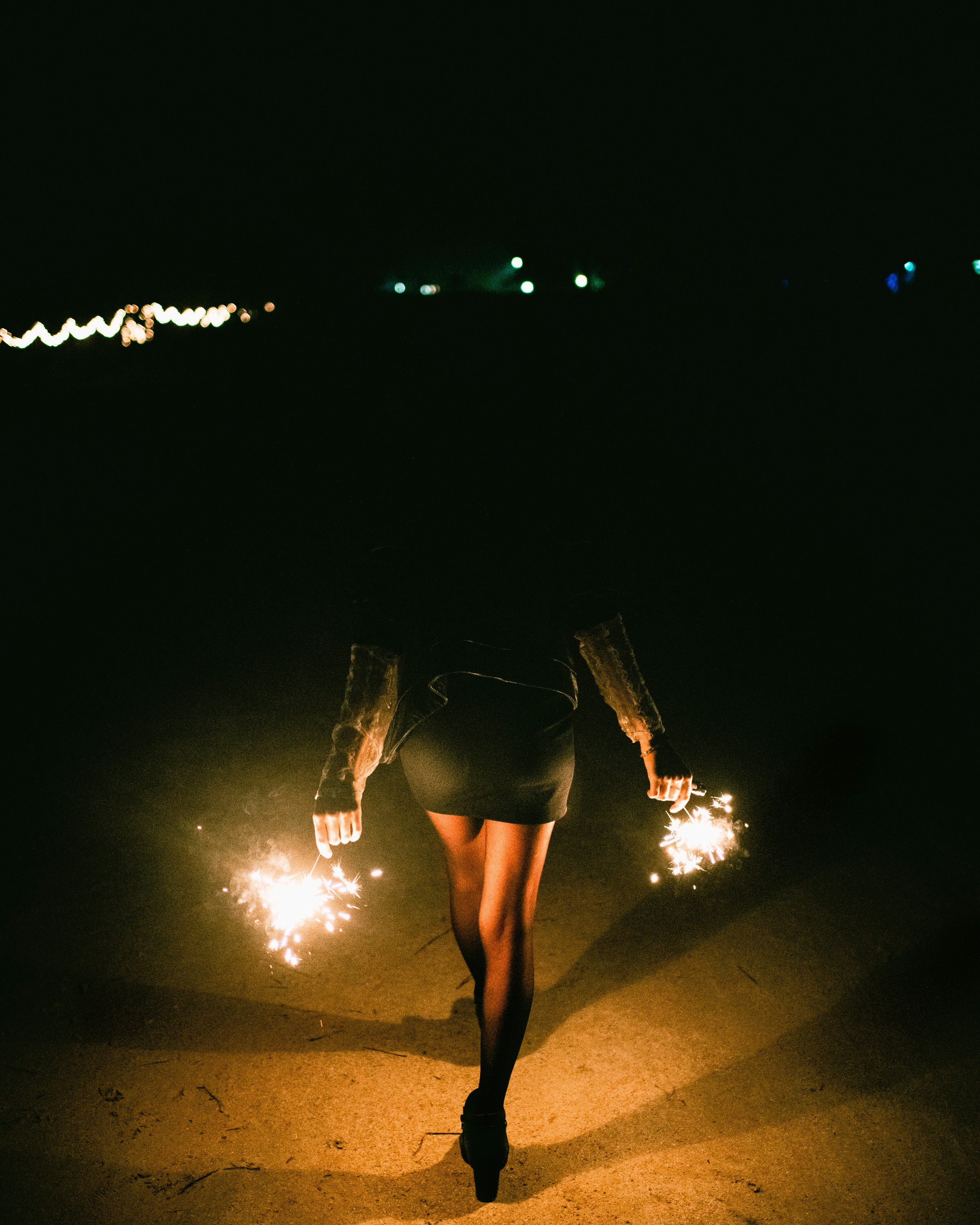 Twin Sparks, Quiet Steps: A Night Walk Illuminated by Fire