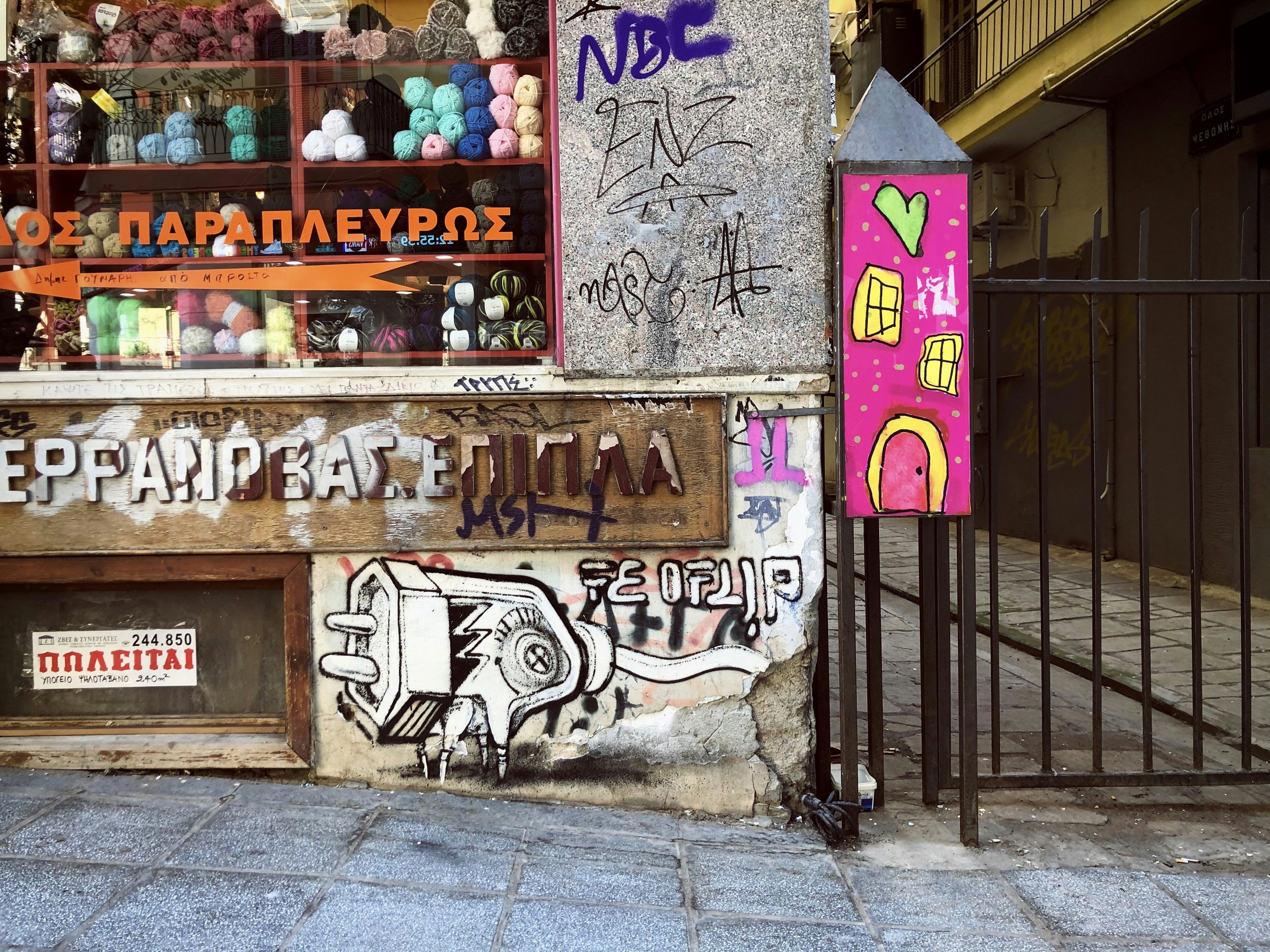 Storefront with graffiti wall photo – Free Graffiti Image on Unsplash