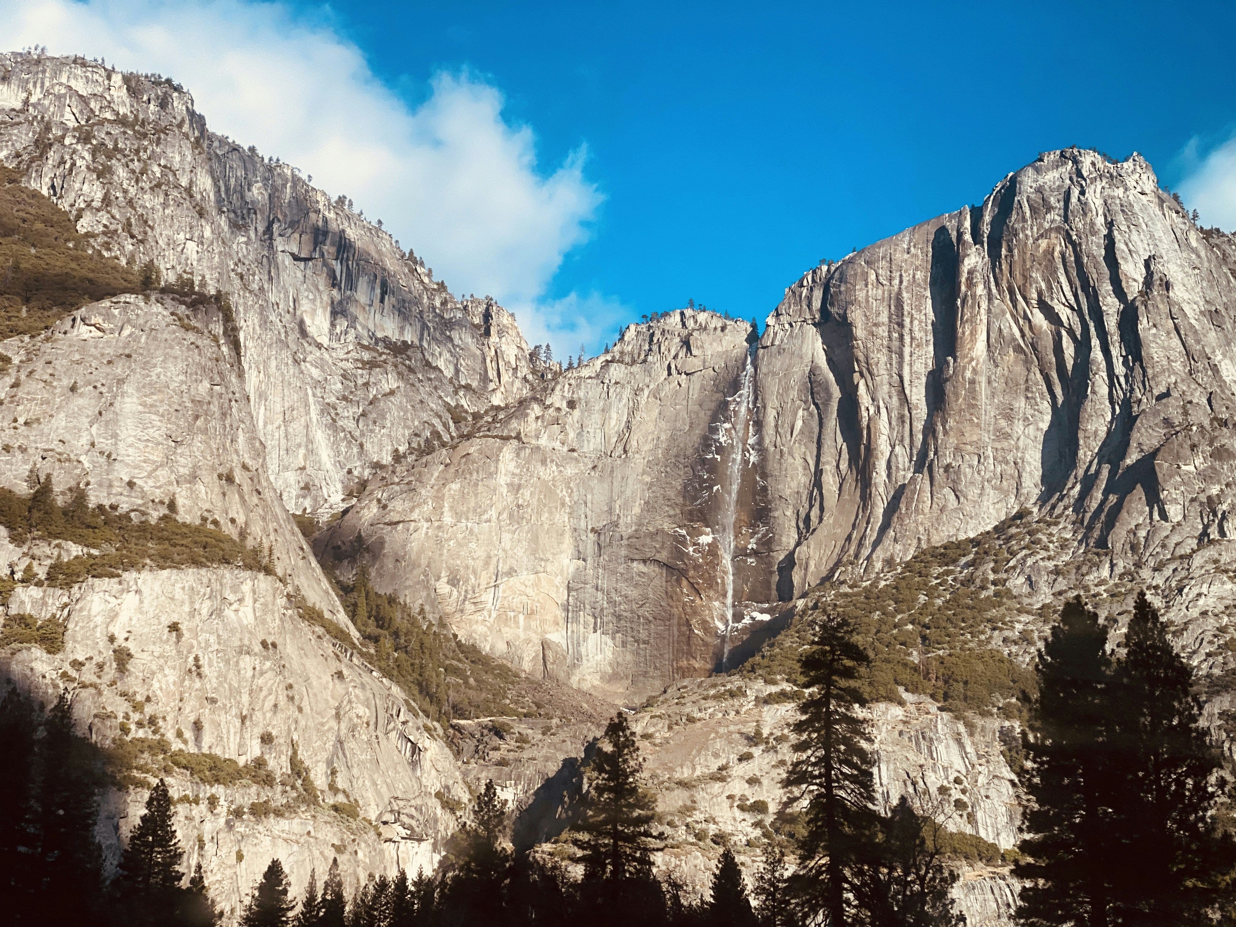 Granite Cathedral: Light, Sky, and Shadow Over a Mountain Gorge