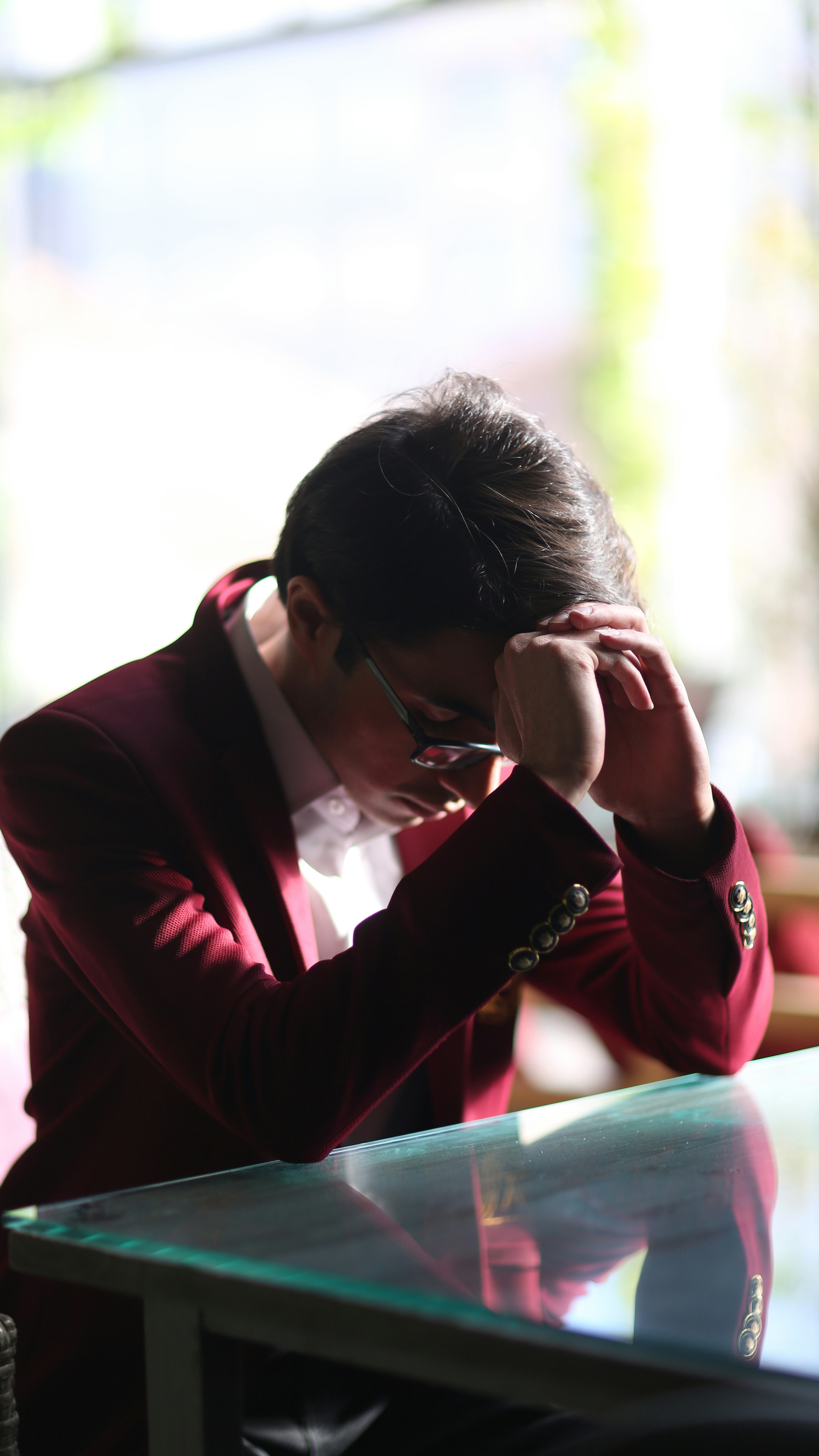 Burgundy Reverie at the Glass Table