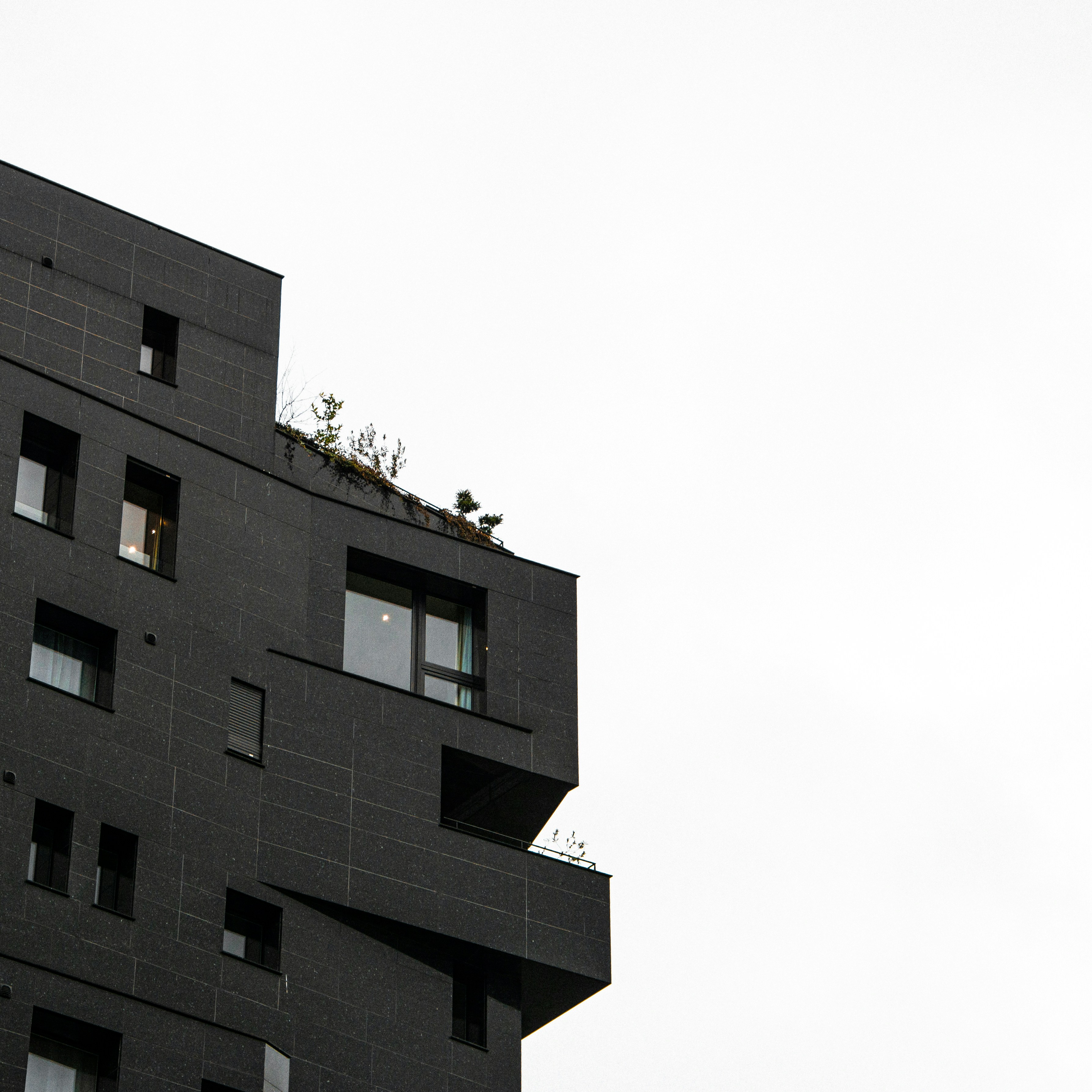 Greyscale photo of building photo – Free Black Image on Unsplash