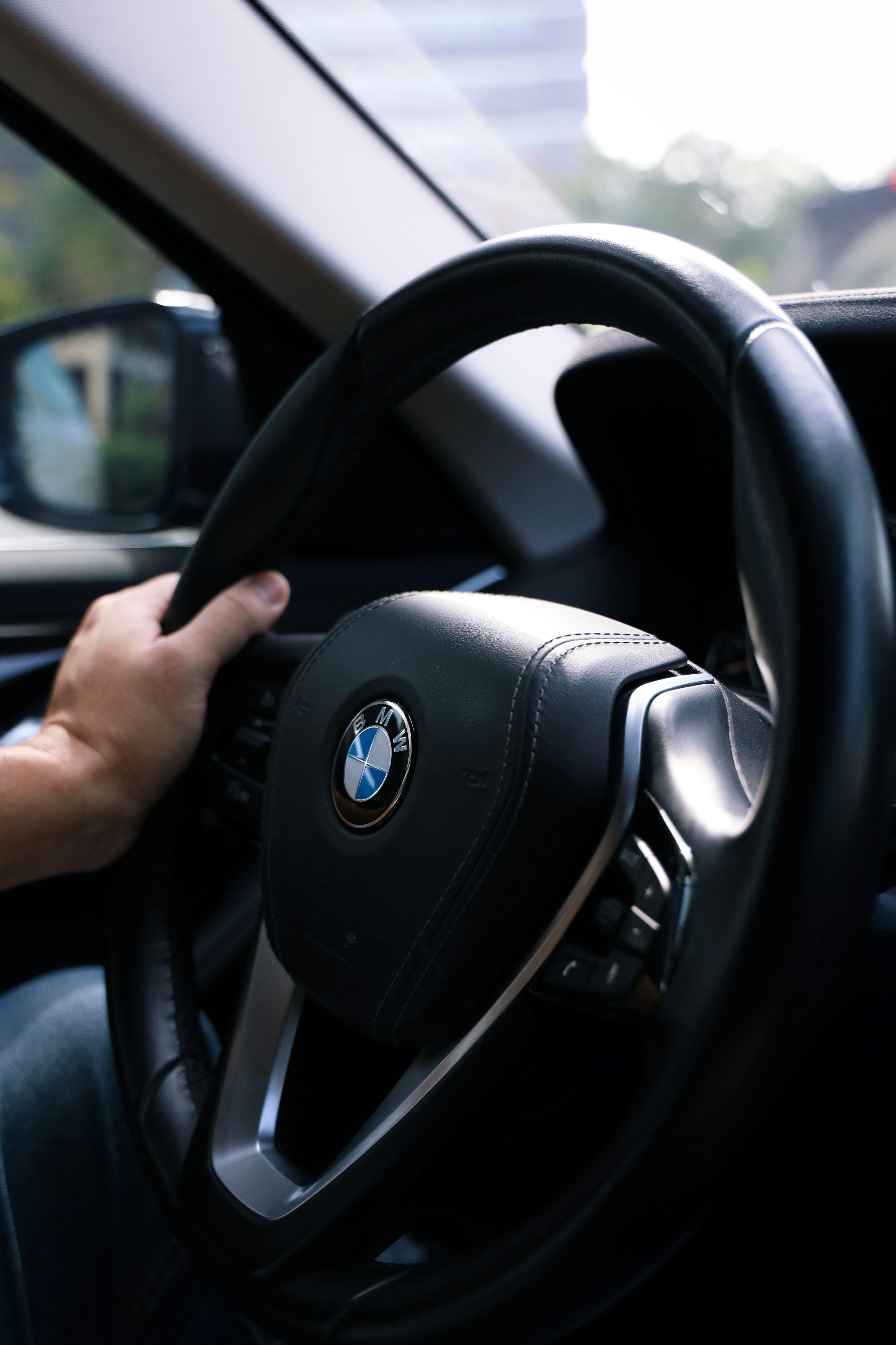 Selective focus photography of black BMW steering wheel photo – Free ...