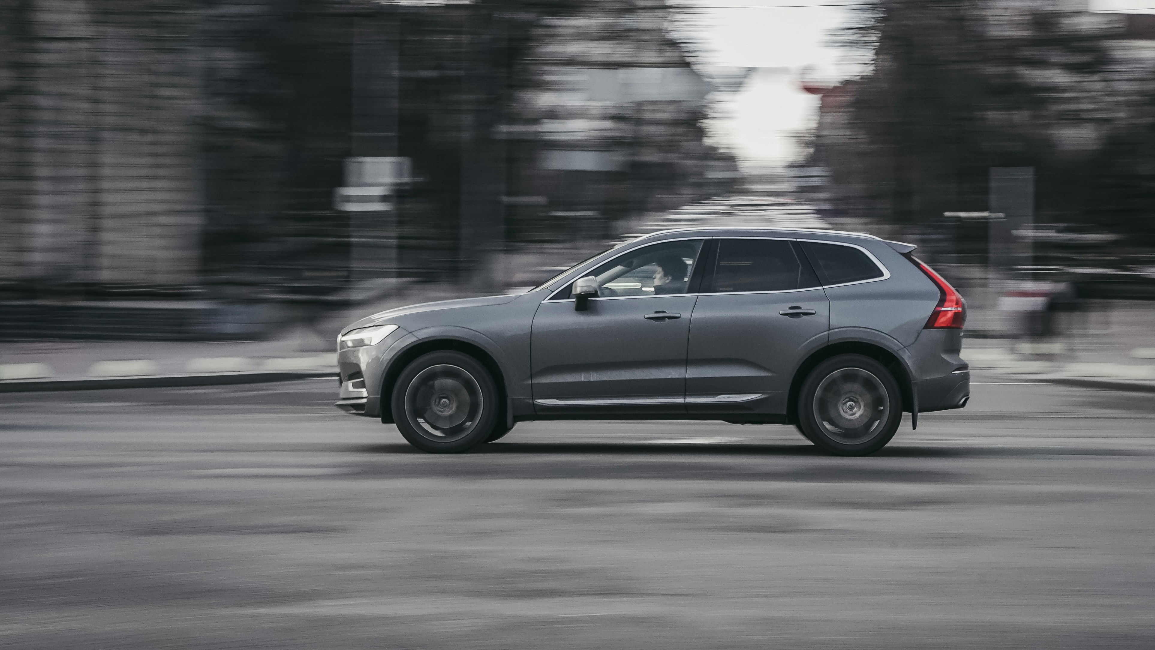 Grey SUV running on the road photo – Free Киев Image on Unsplash