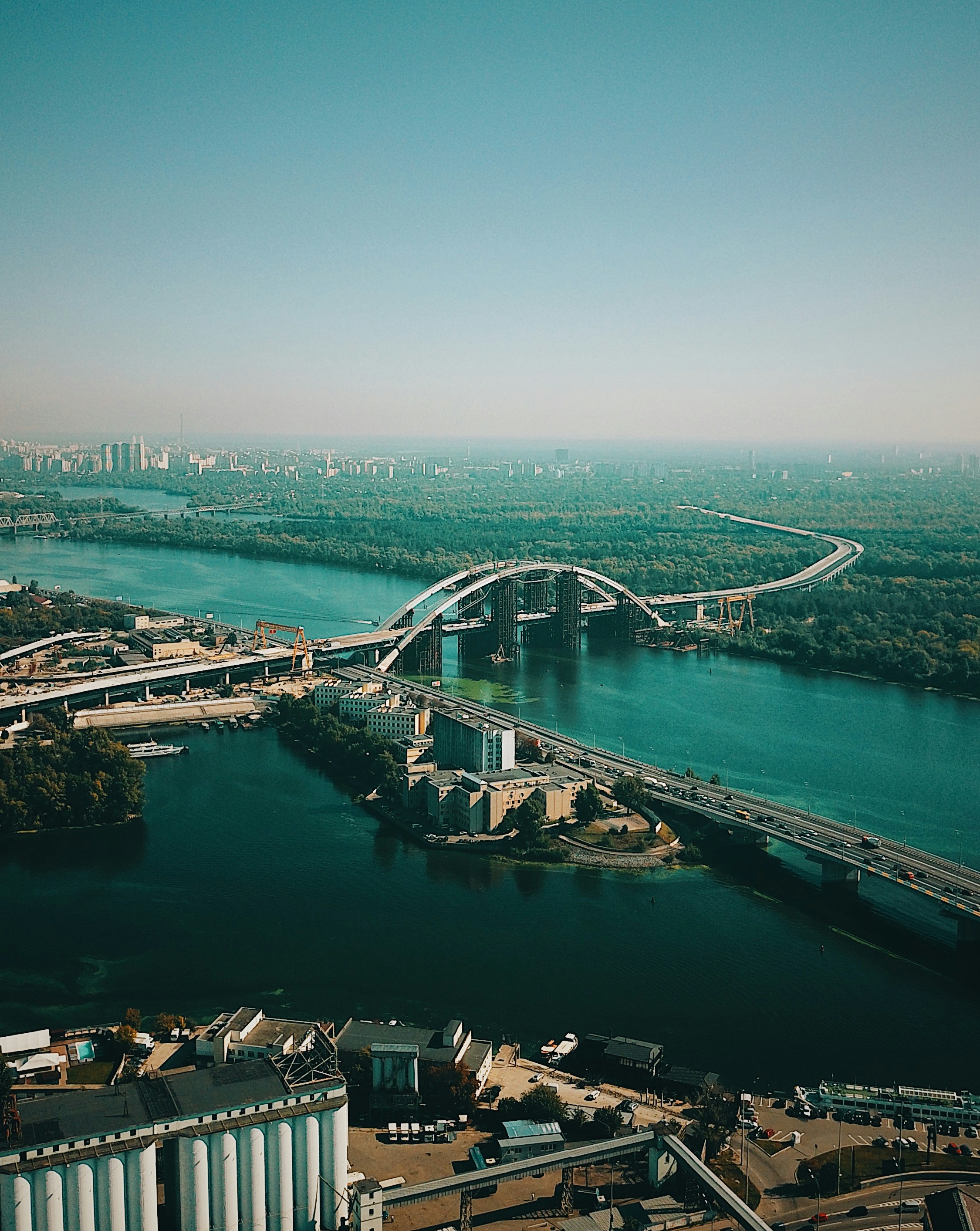 Aerial view of bridges between trees and buildings photo – Free Подол ...