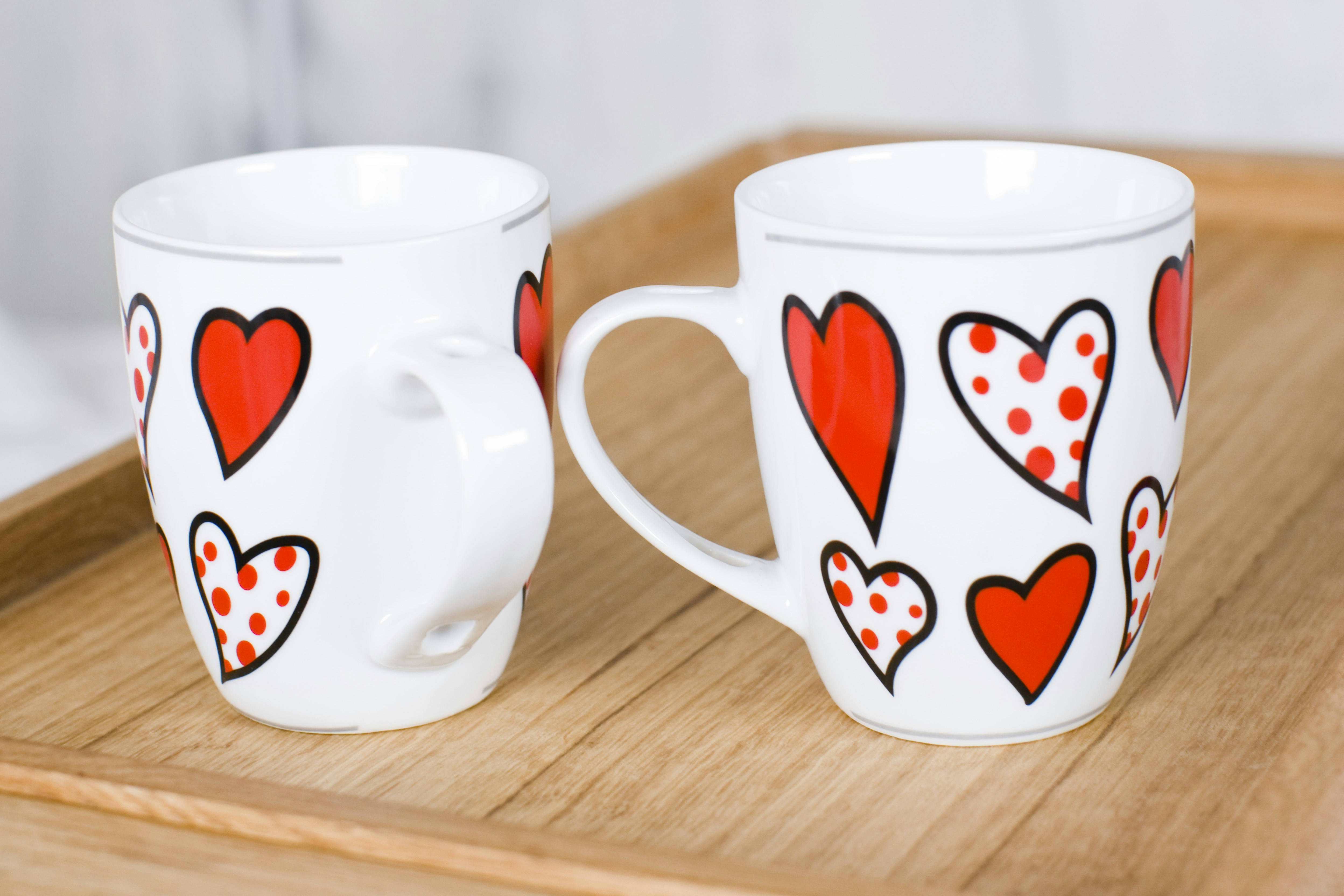 Two white-and-red heart print ceramic mugs photo – Free Valentines day ...