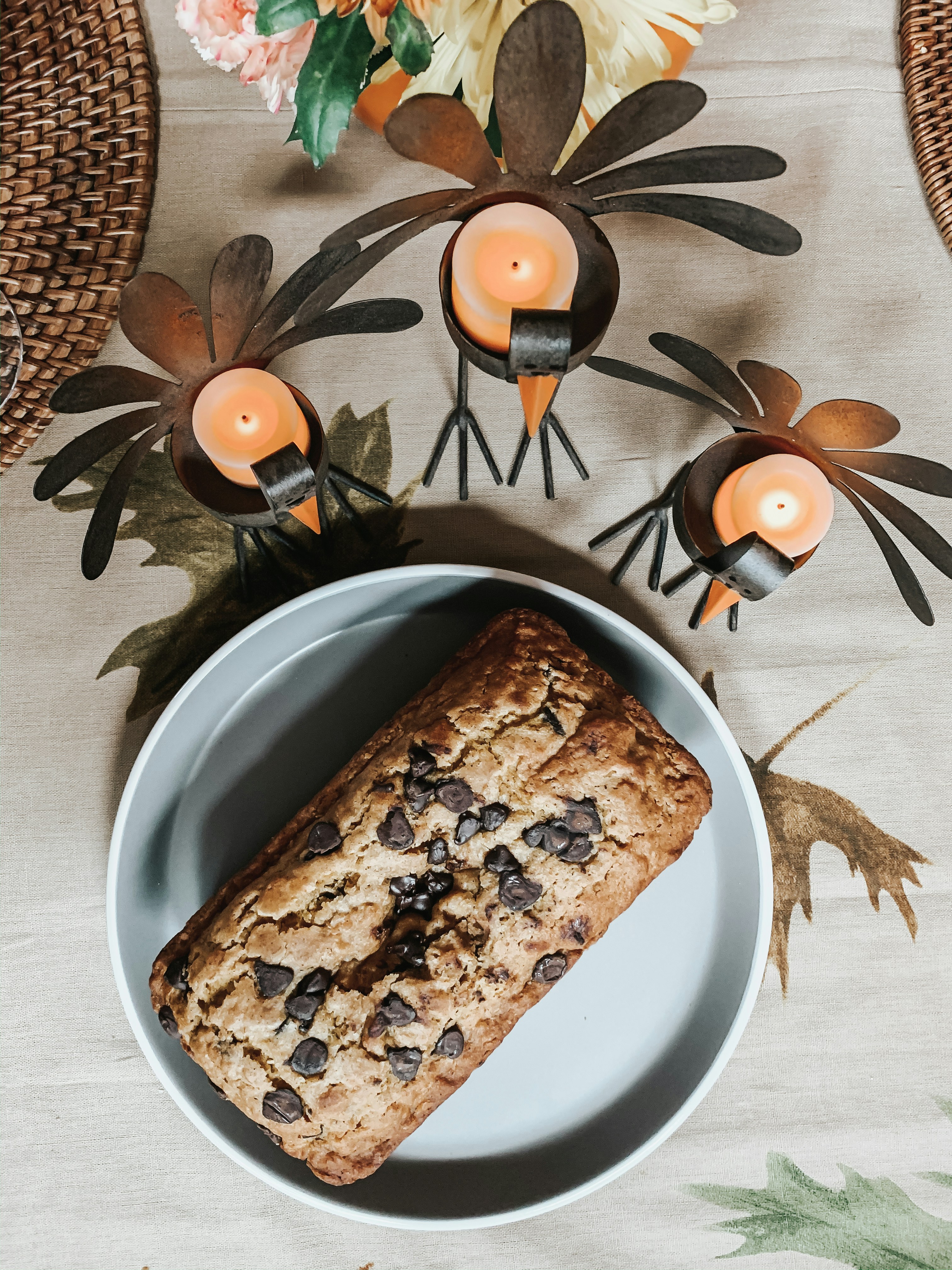 Chocolate Chip Banana Bread Beneath Decorative Chickos
