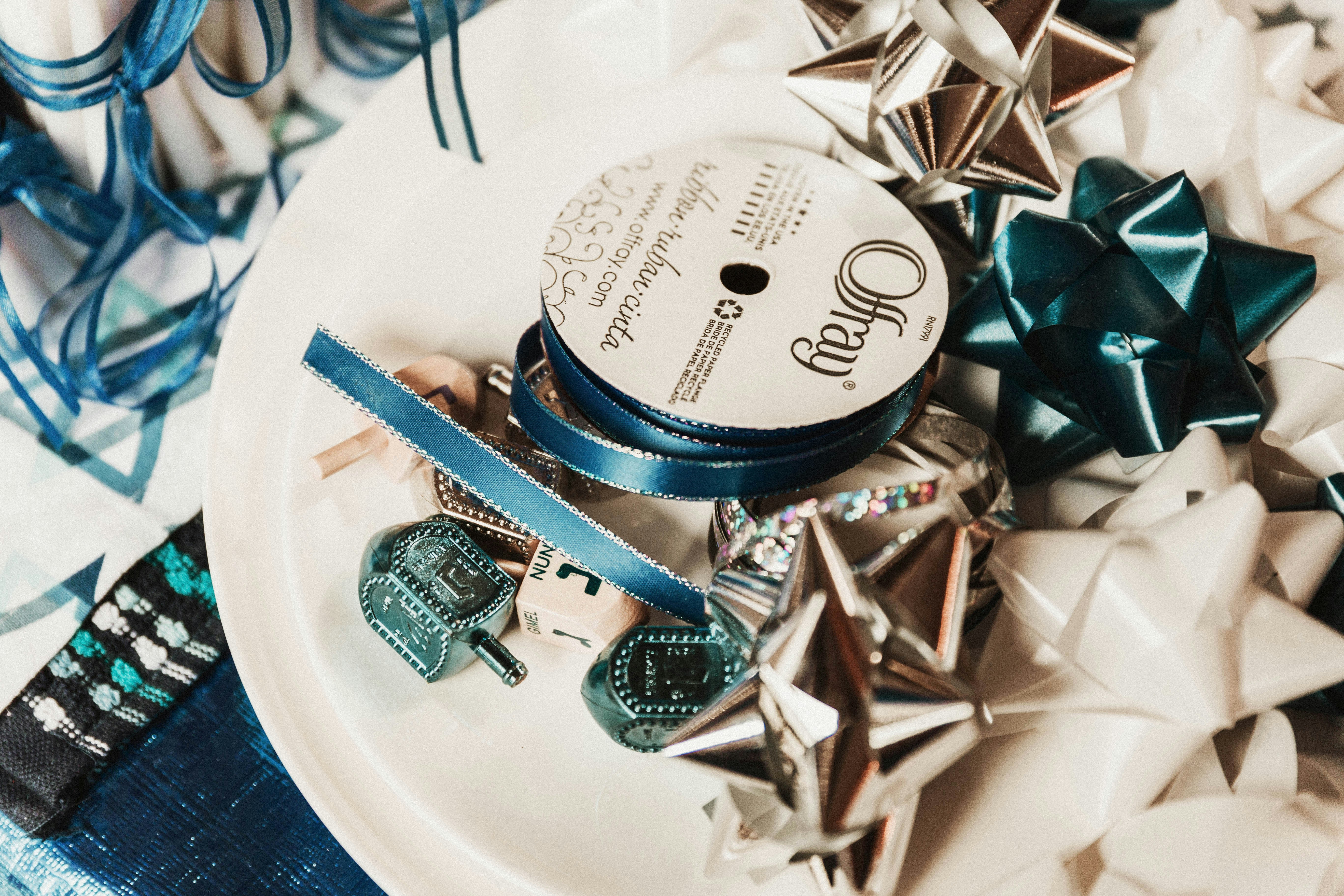 A Festive Array: Ribboned Sleigh of Gift Wrappings and Spools