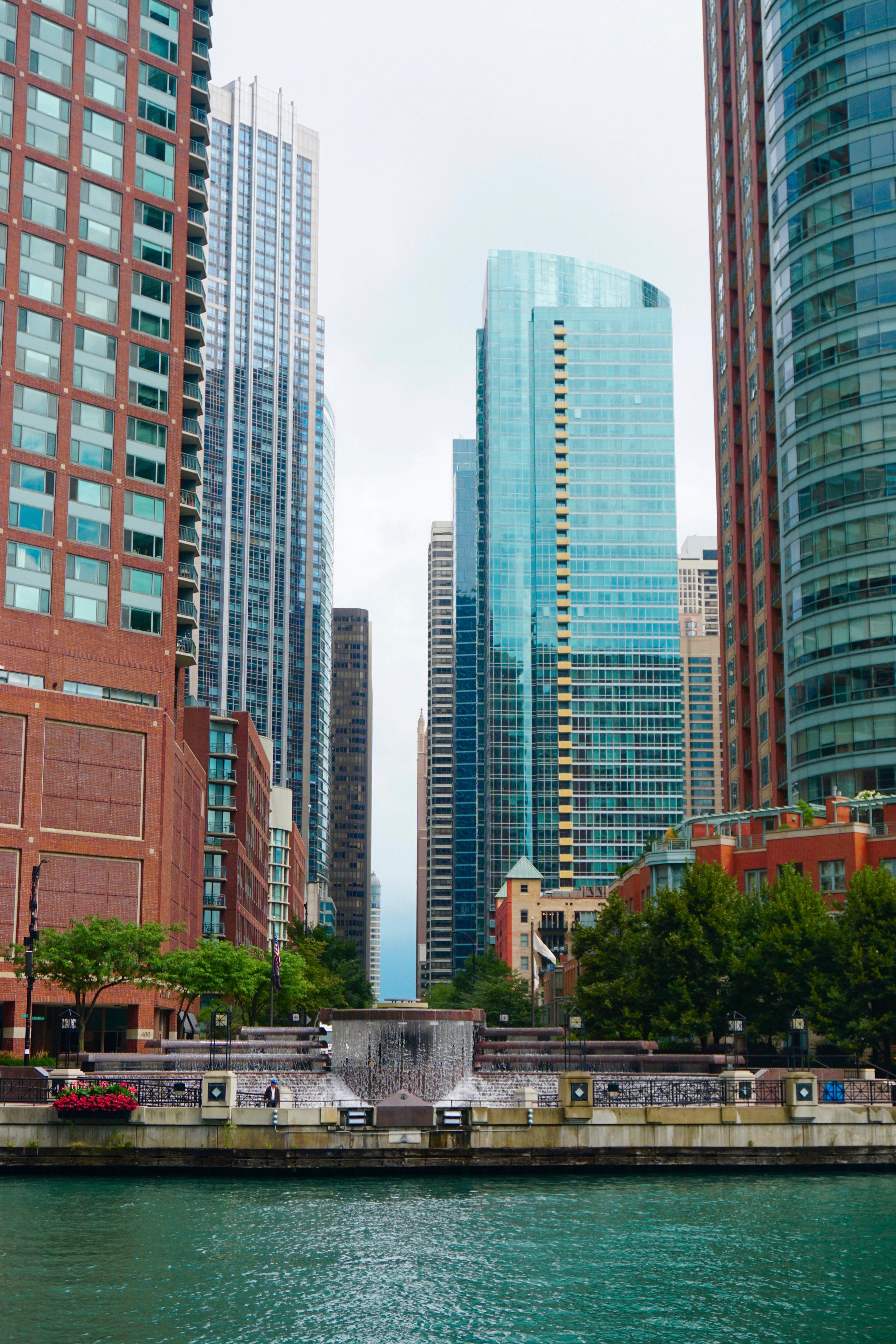 The Chicago River runs smoothly through the City of Chicago and creates an elegant and sophisticated atmosphere. | buildings beside body of water