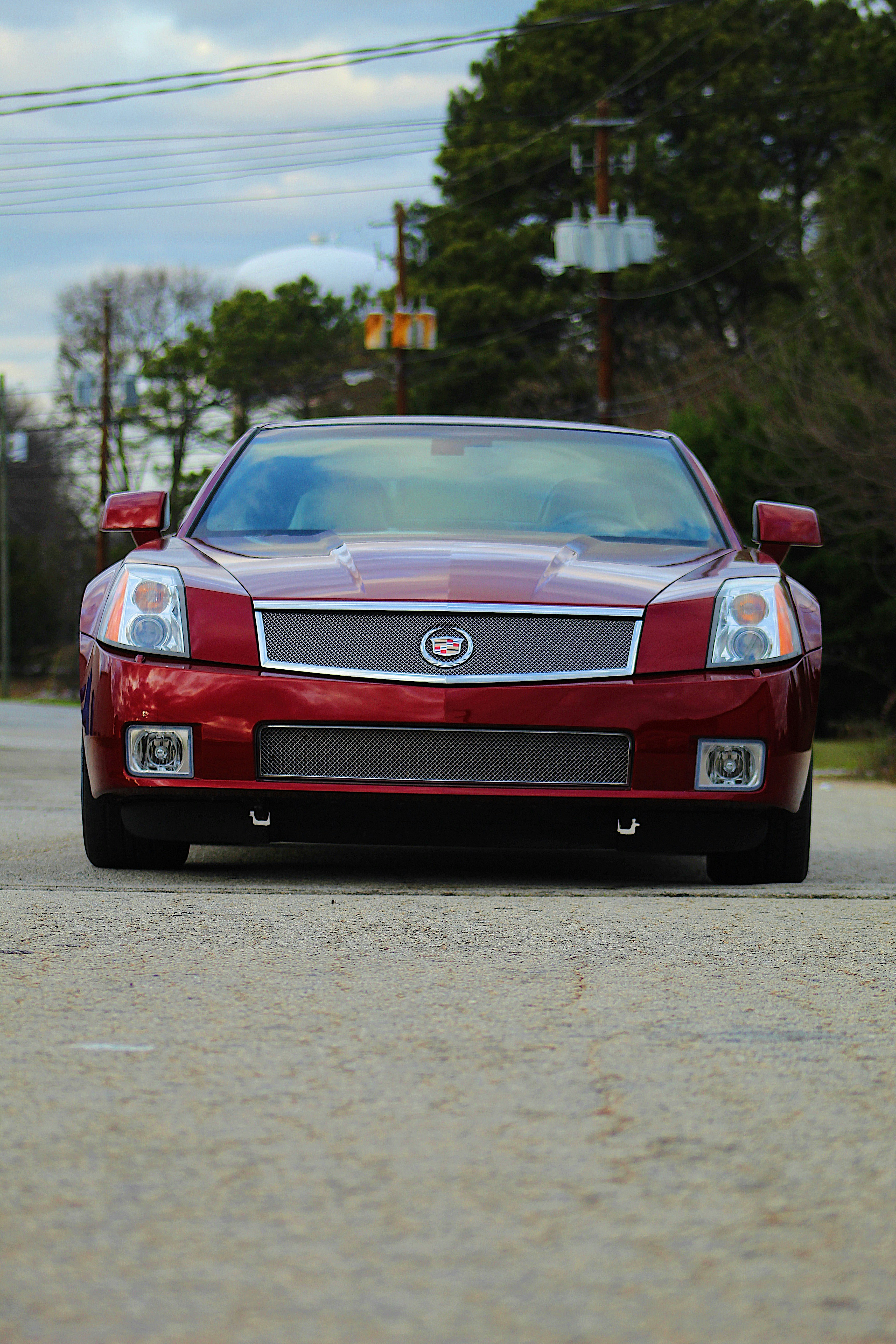 Red Cadillac coupe photo – Free Automobile Image on Unsplash
