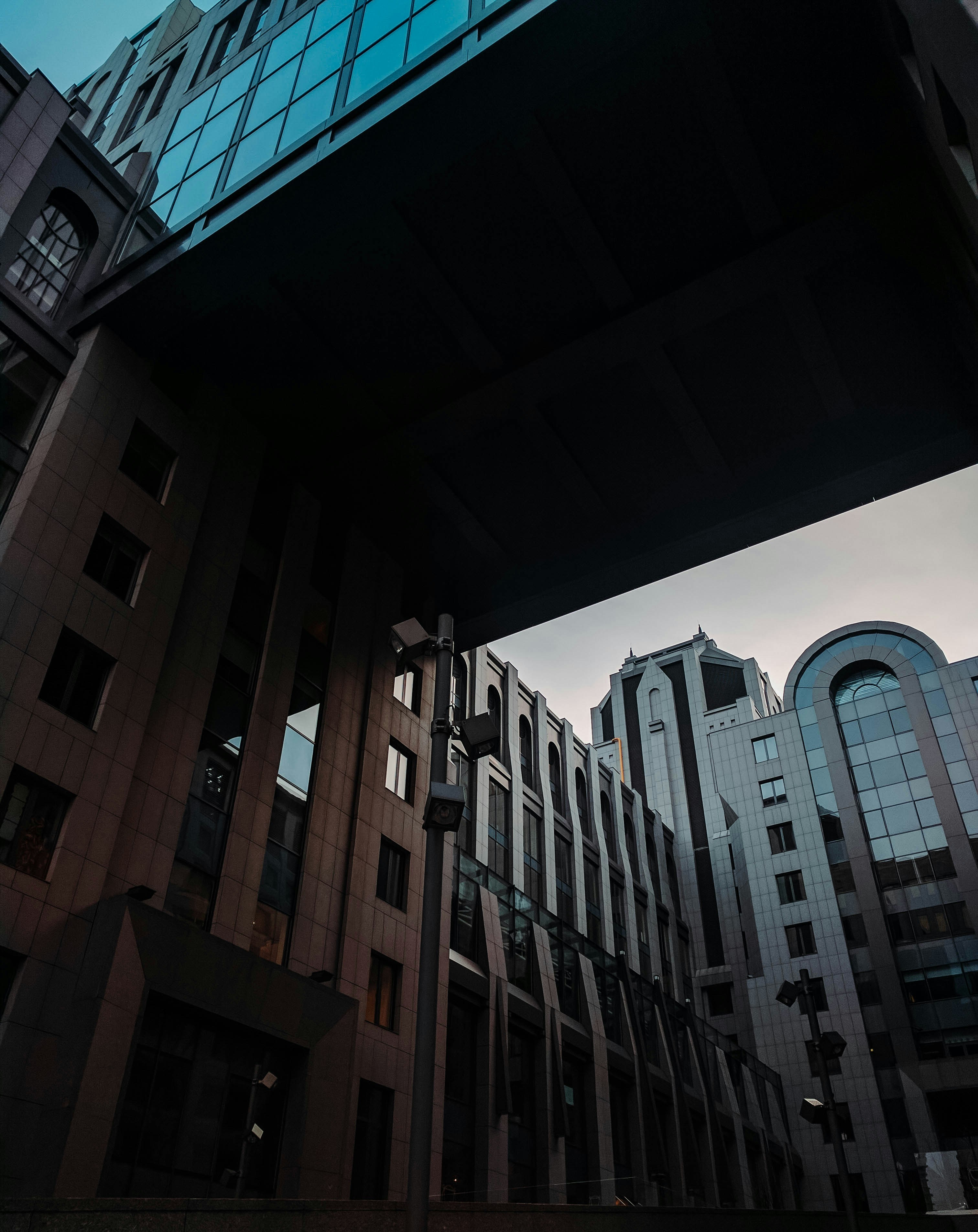 Under the Overhang: City Architecture Framed by Prism Glass