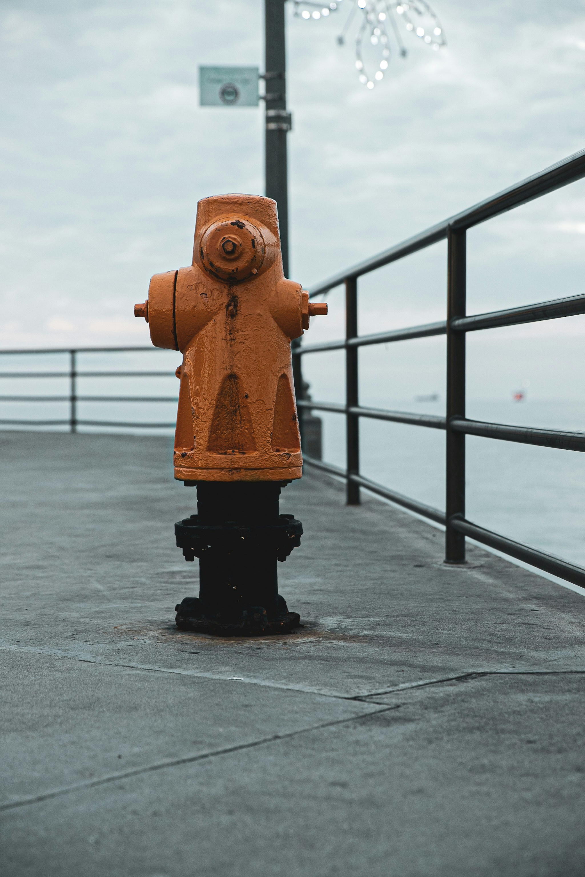 Rust-Orange Sentinel at the Pier's Edge