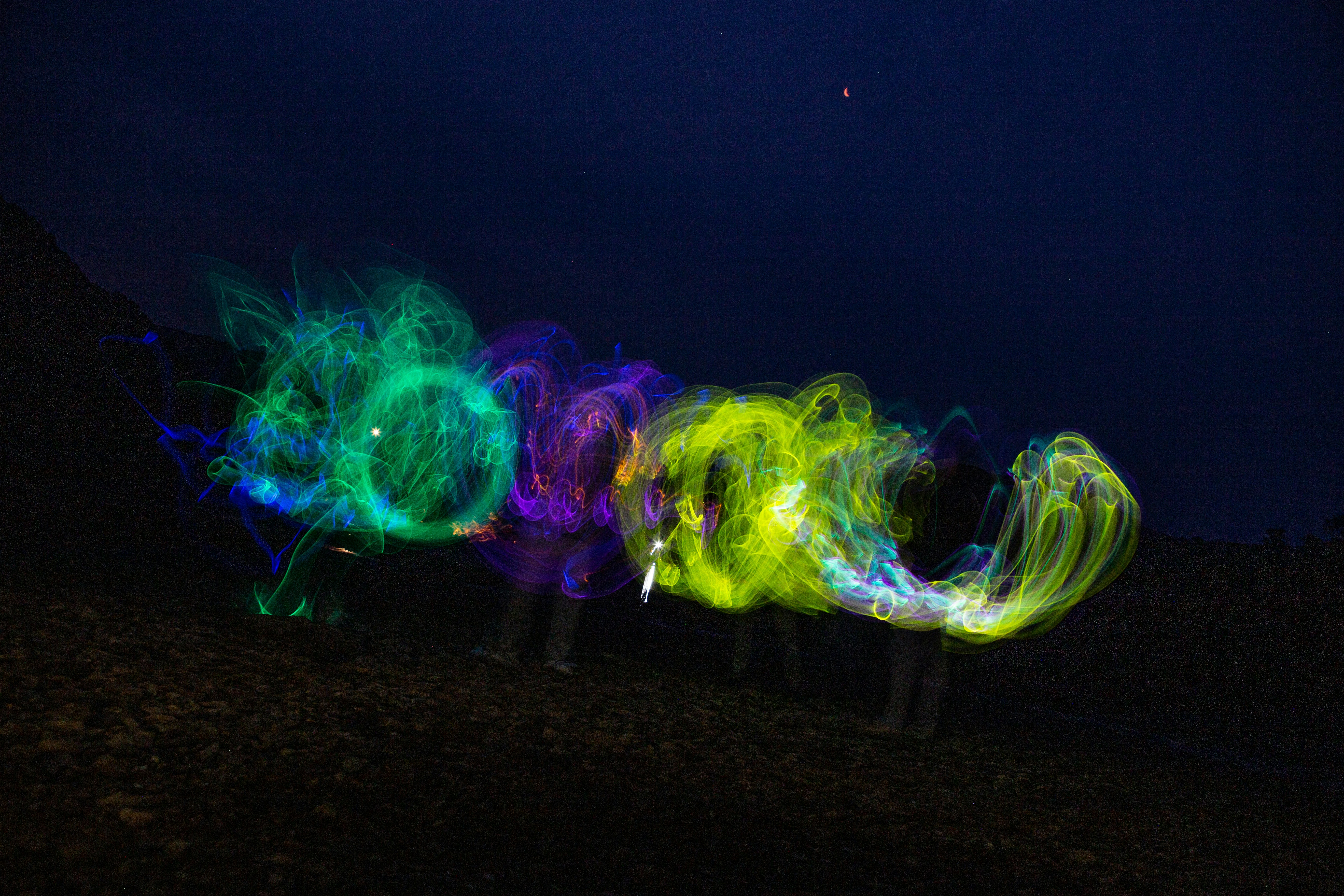 Neon Trails of Night: A Lantern Parade in Colorful Smoke