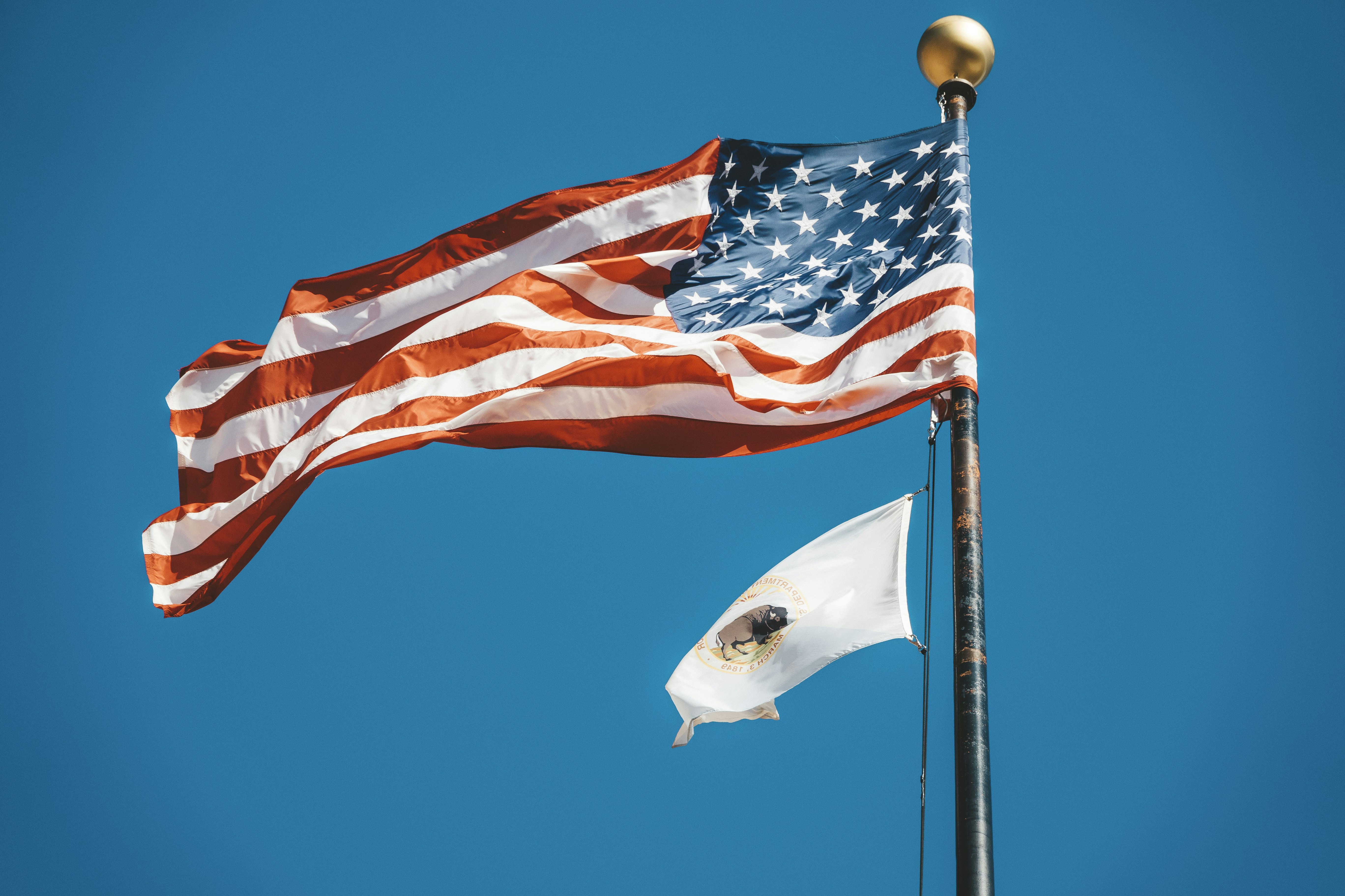 Stars, Stripes, and a Cerulean Sky: Flagpole in Motion