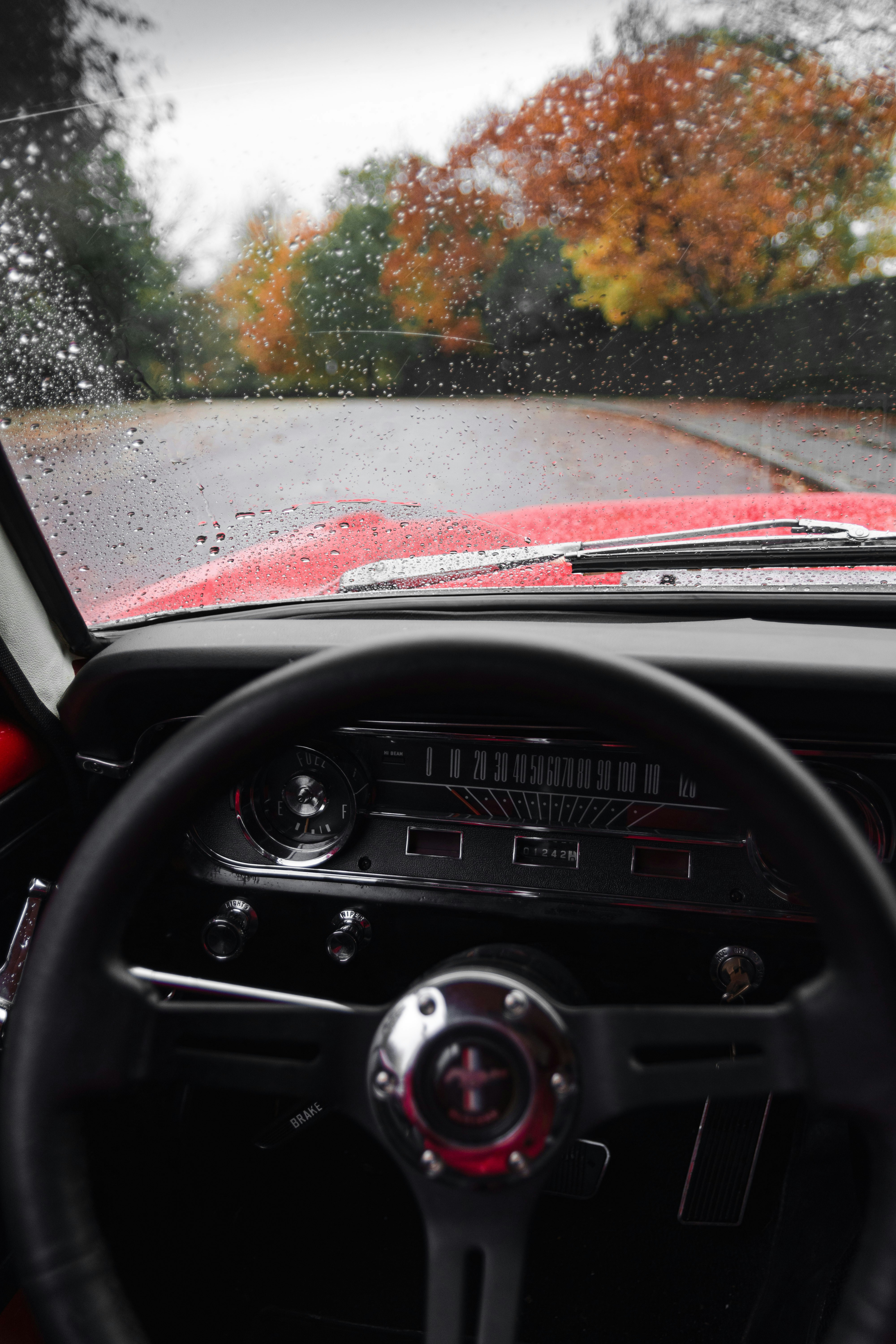 Raindrops on a Vintage Dash: Autumn Drive from the Driver's Seat