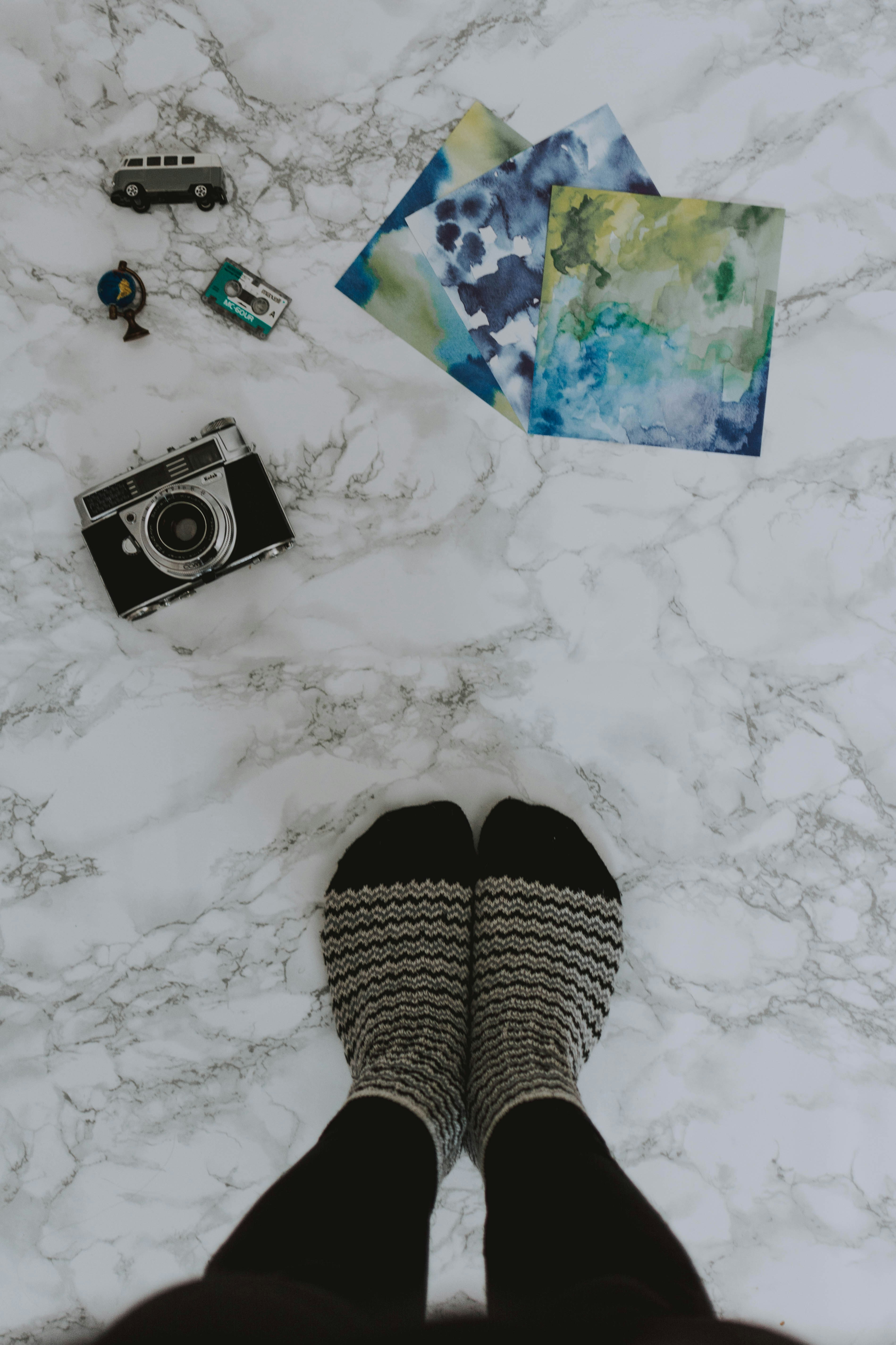 Cozy Studio Snowwalk: Socks, Camera, and Watercolor Remnants