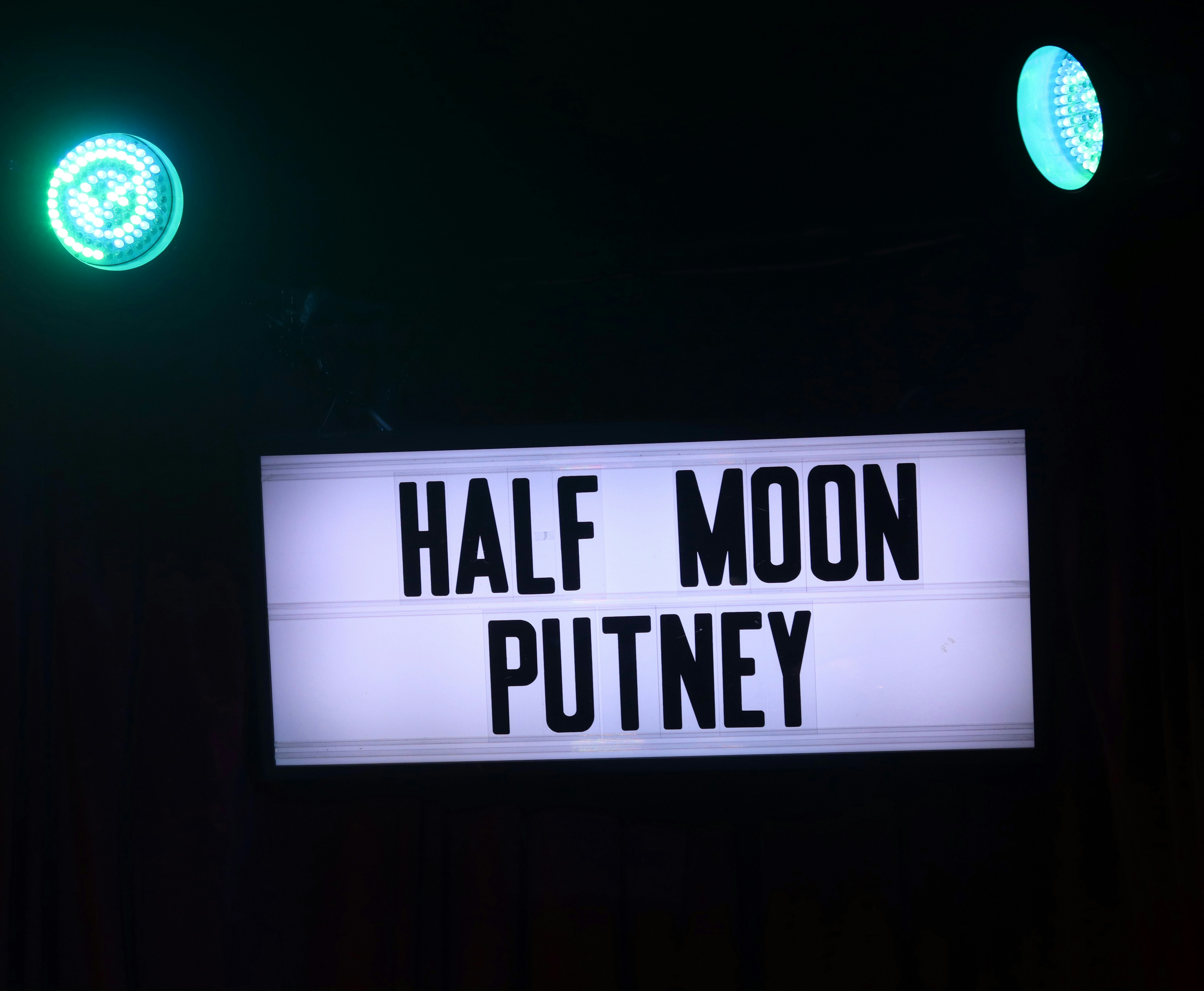Half Moon Putney sign photo – Free Blue Image on Unsplash