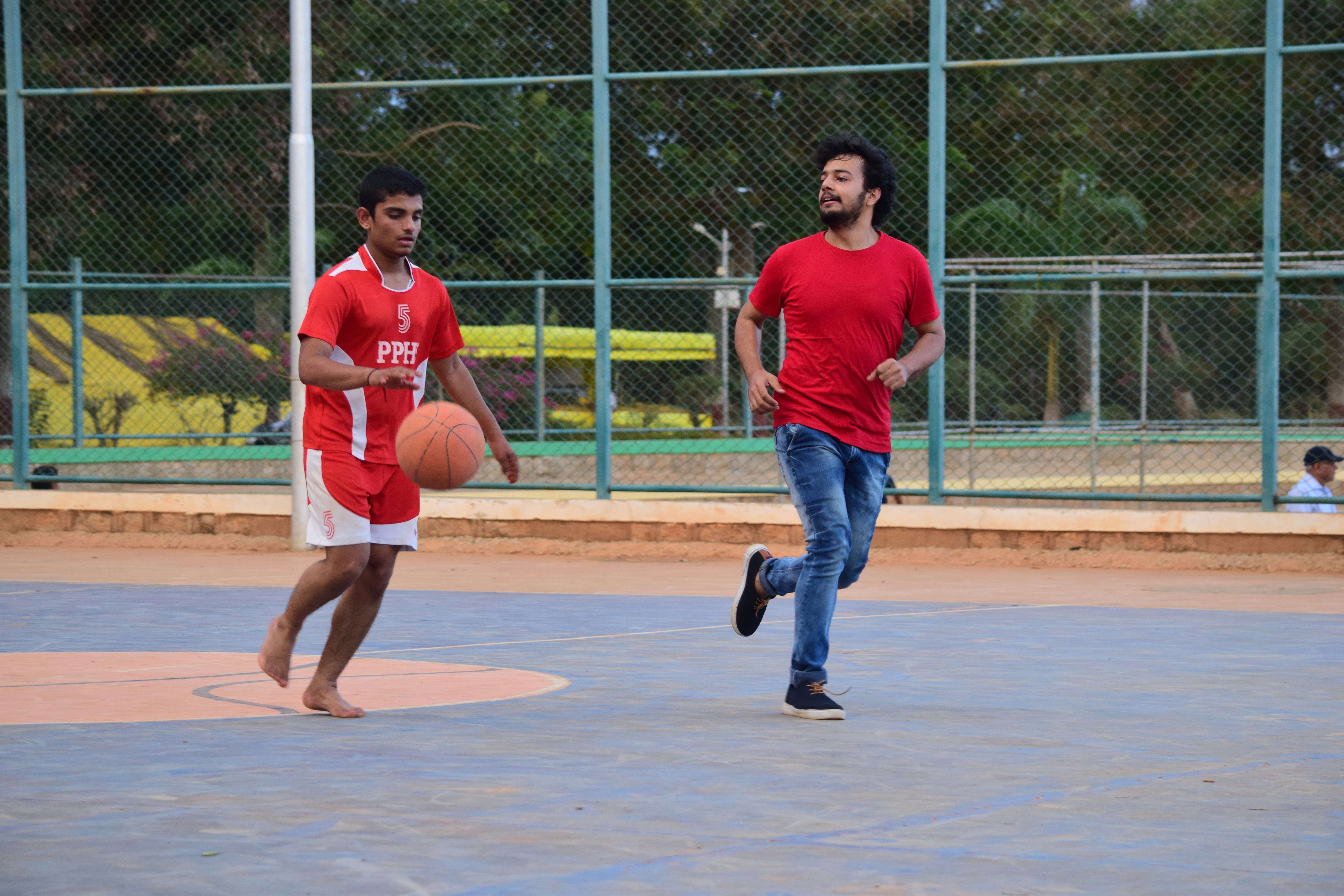 Momentum on a Painted Outdoor Court: Red Jerseys in Play