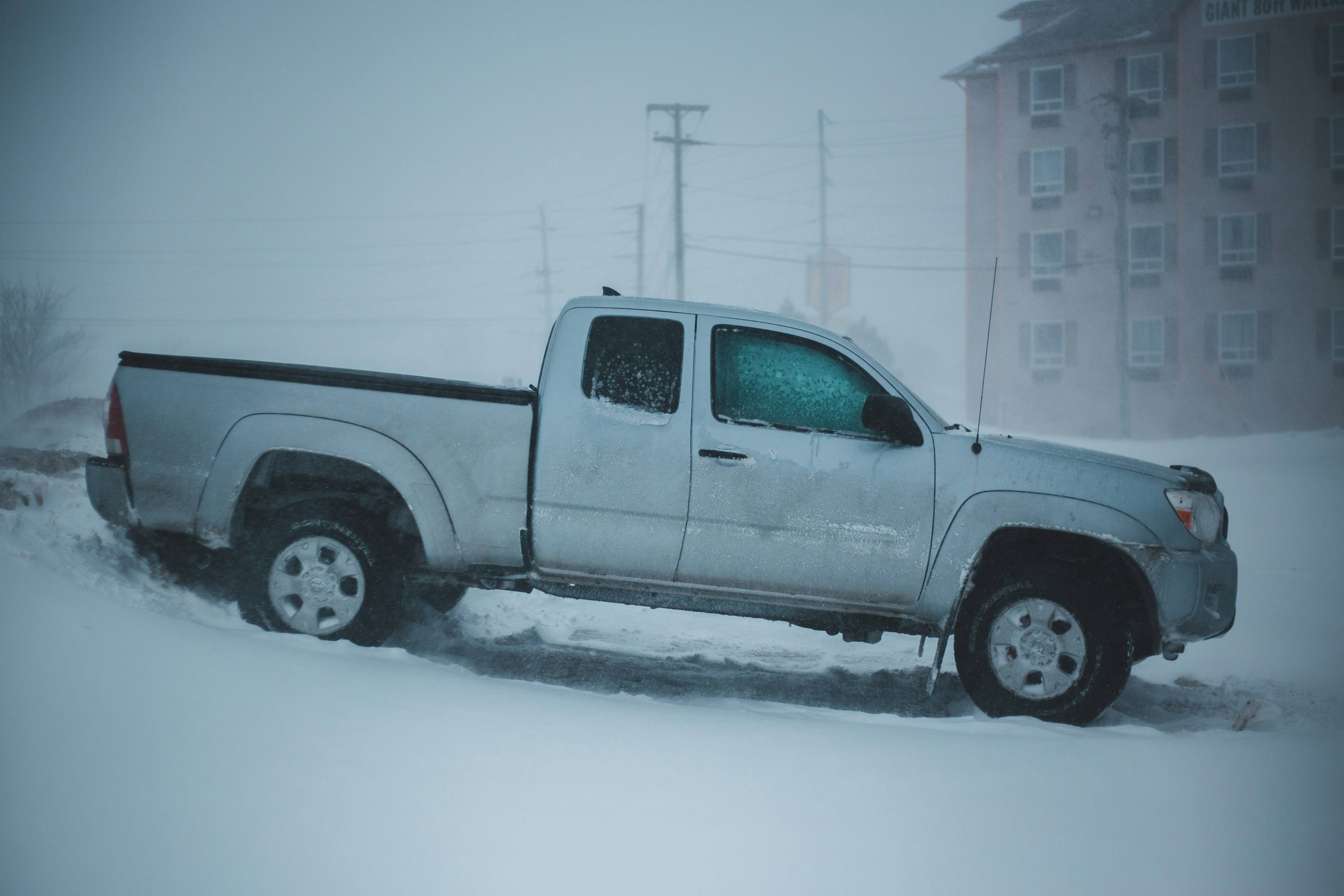 Snowbound Ranger: a lifted pickup braces against a frosty wind