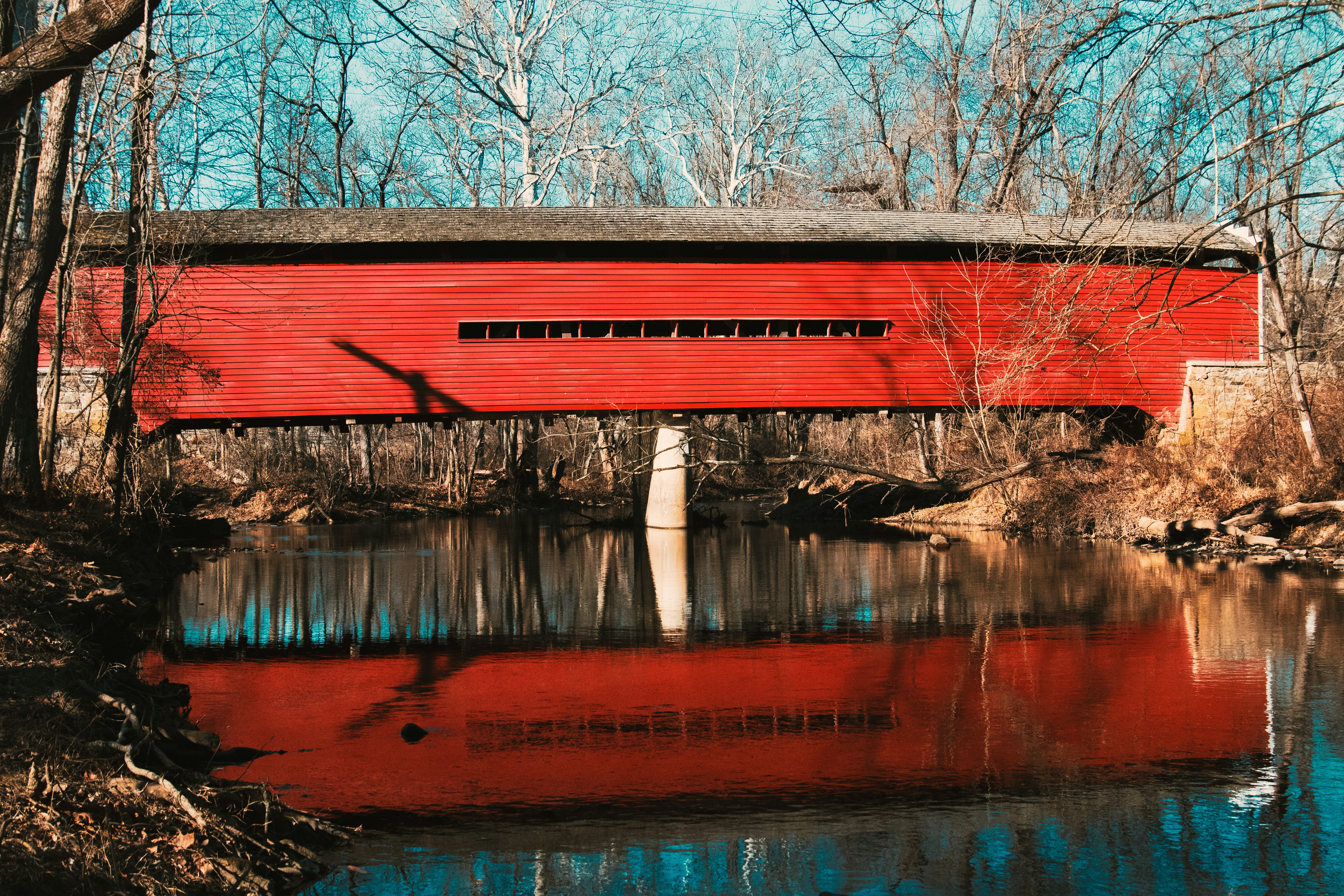 Red Covered Bridge Reflected: Winter Quiet on a Glassy Stream