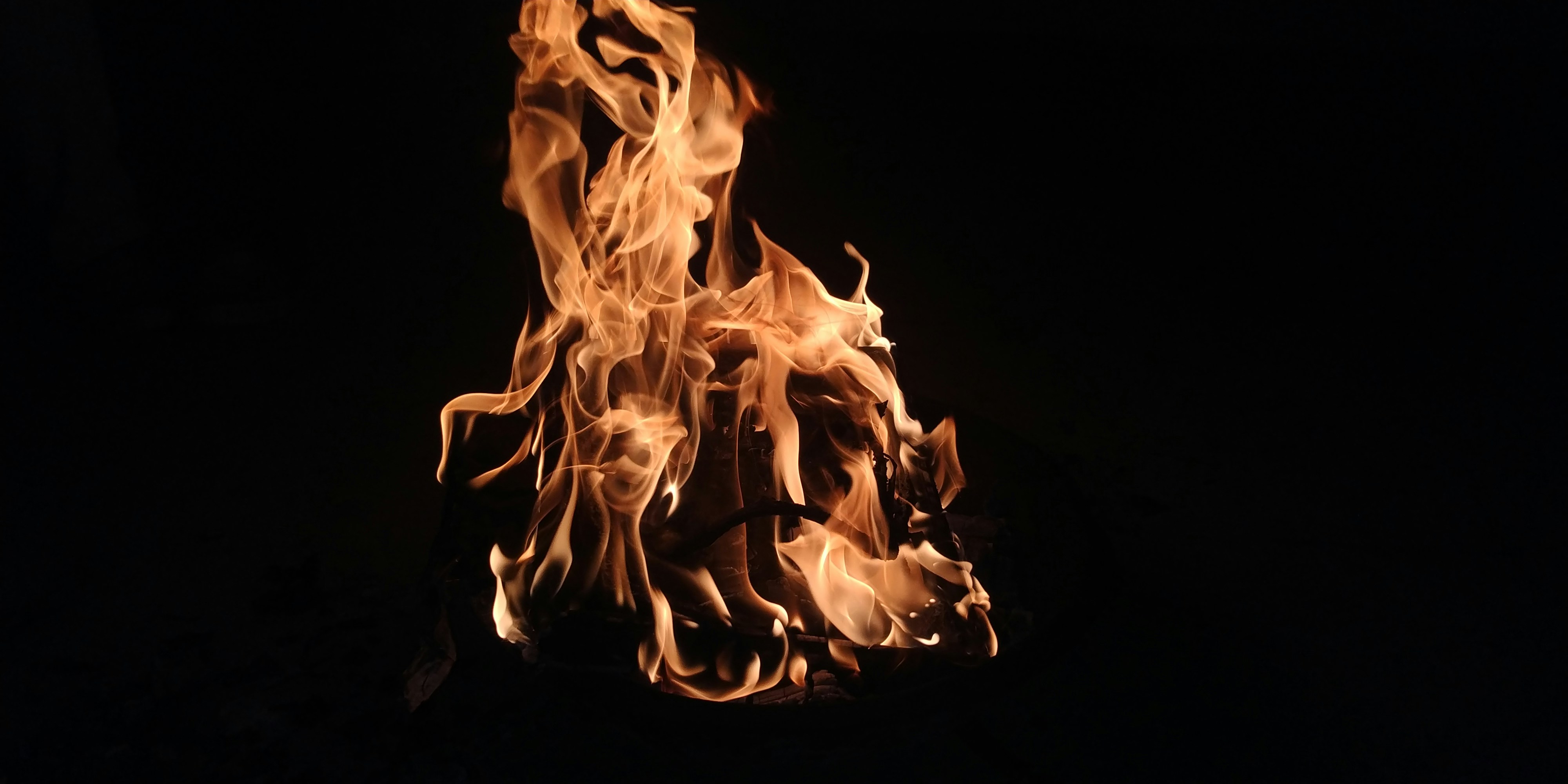 A close up of a fire in the dark photo – Free Fire Image on Unsplash