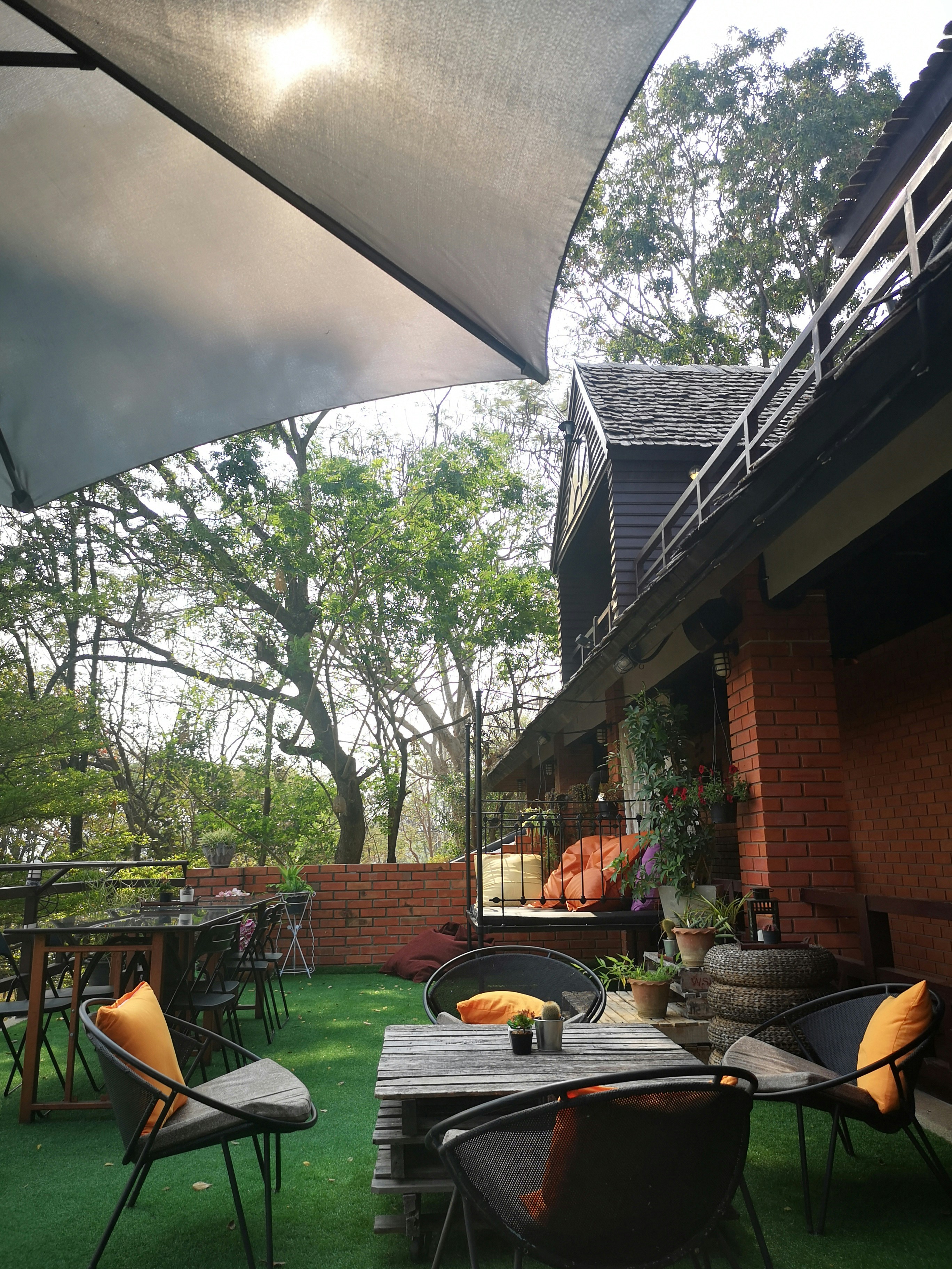 Sunlit Courtyard Lounge Under a Shade Sail