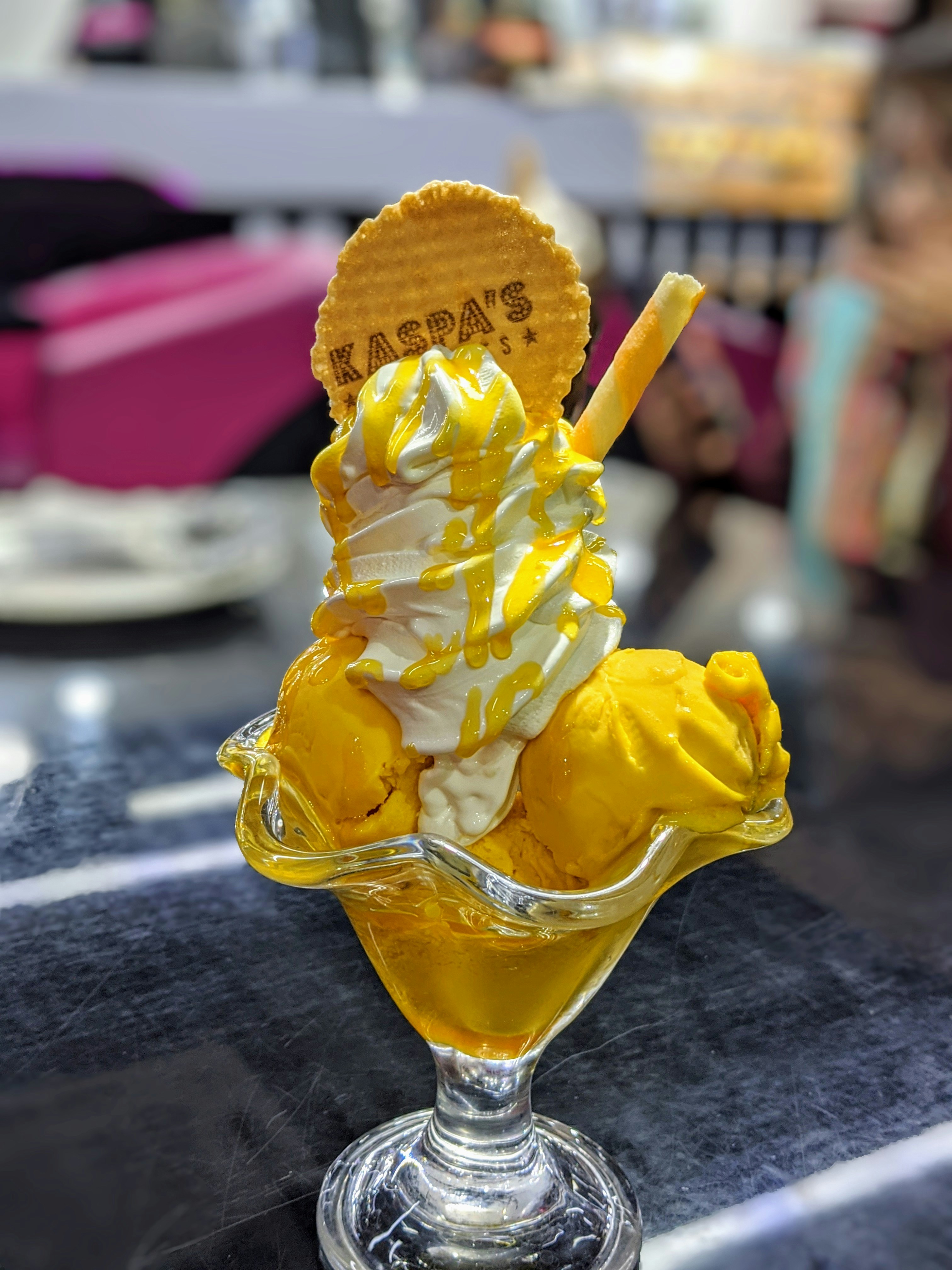 Yellow ice cream cone on clear glass cup photo – Free Cream Image on ...