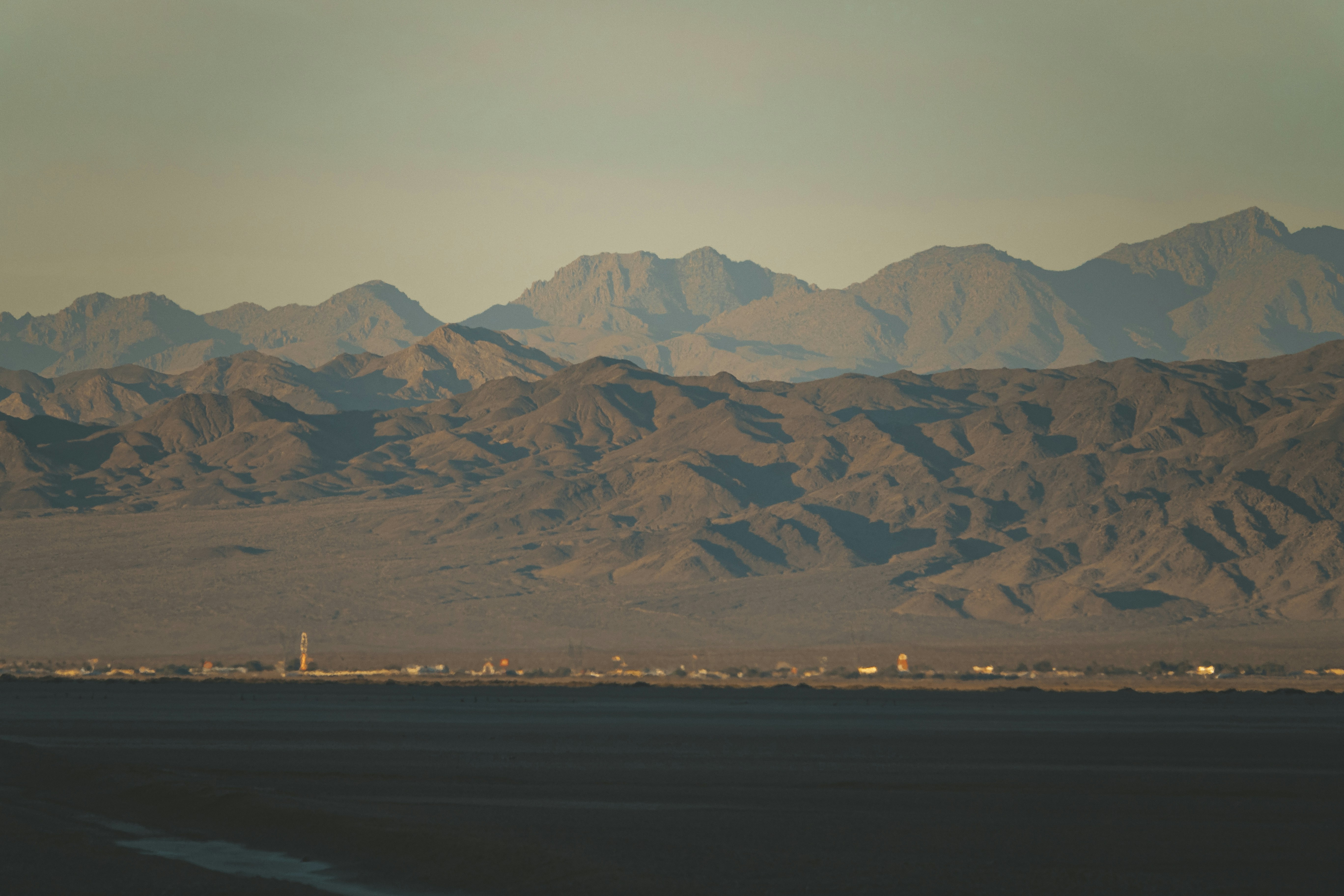 Golden Light Over Mojave's Rugged HorizonAndi Wieser