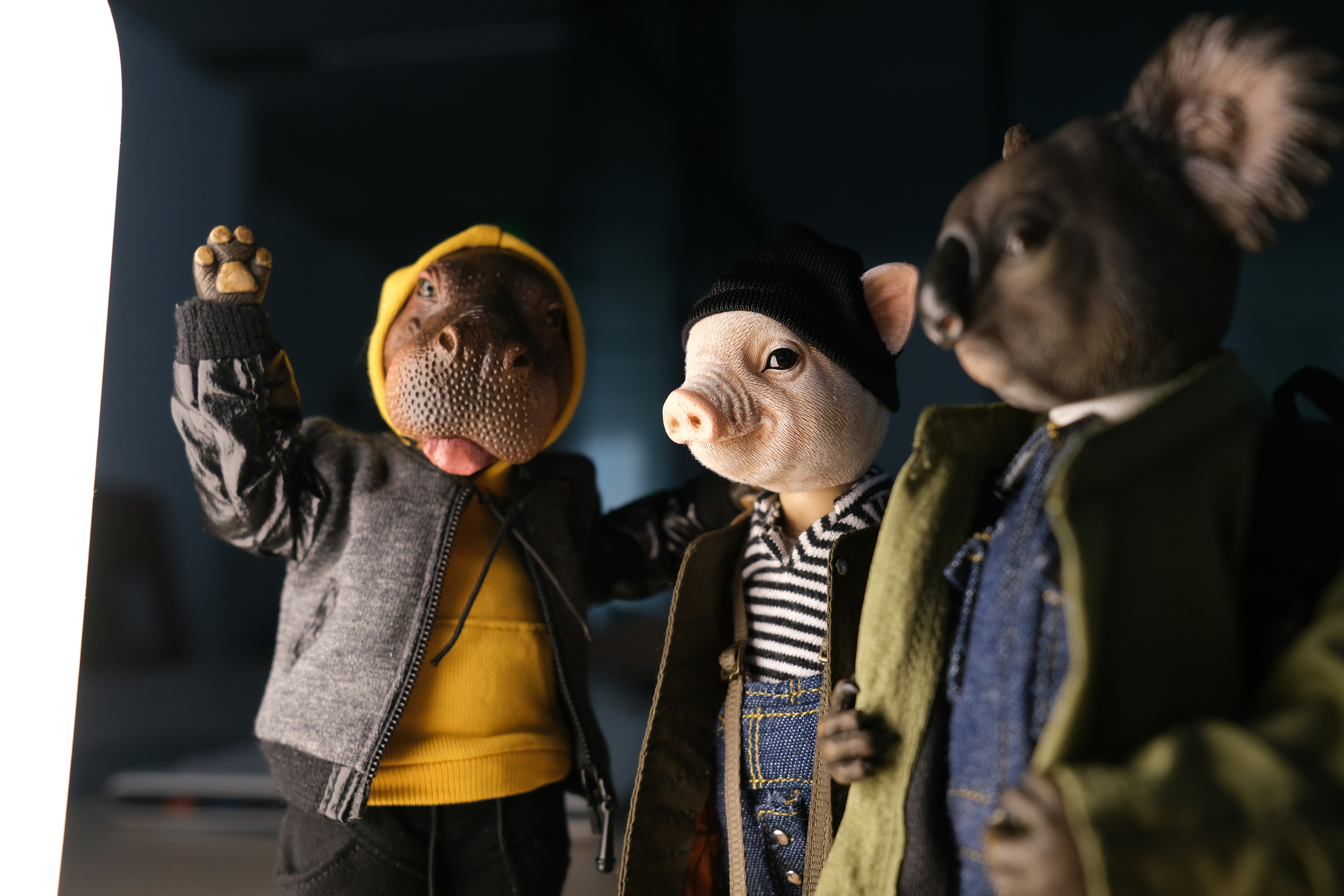 Masked Puppets in a Studio Spotlight