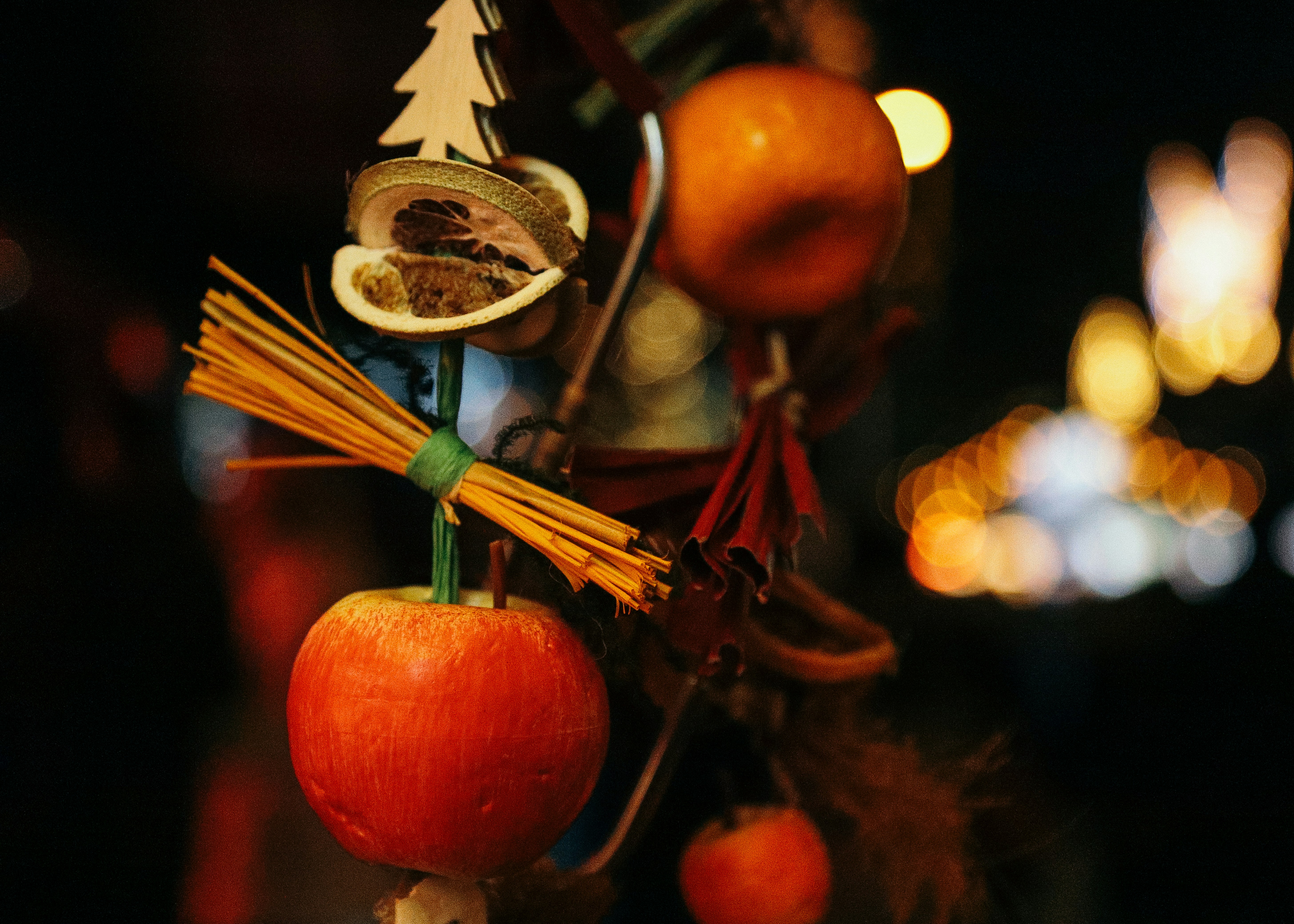a bunch of fruit hanging from a treeAlexey Savchenko