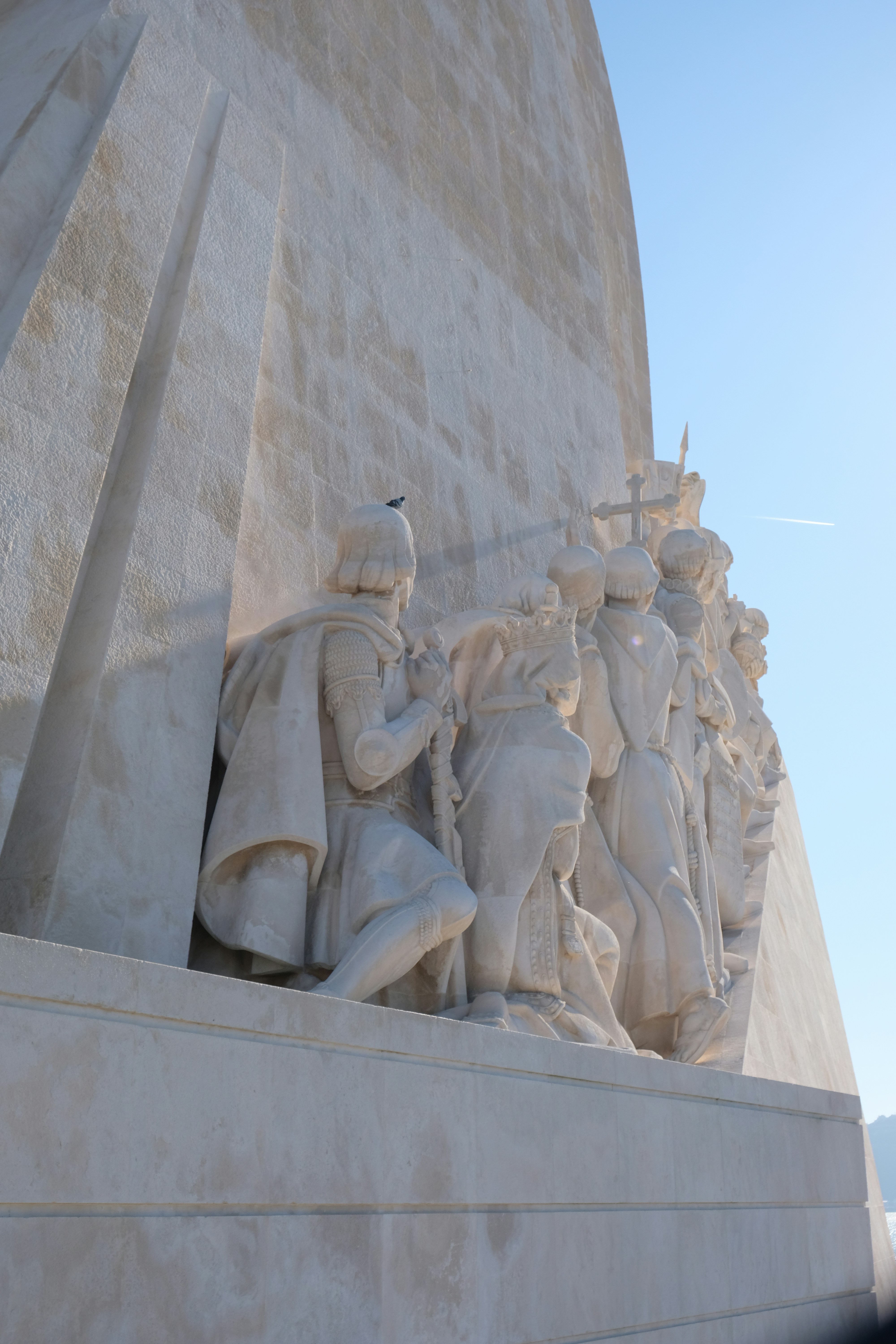 Intricate stone sculptures depicting historical figures, showcasing craftsmanship and artistry in a monumental setting.