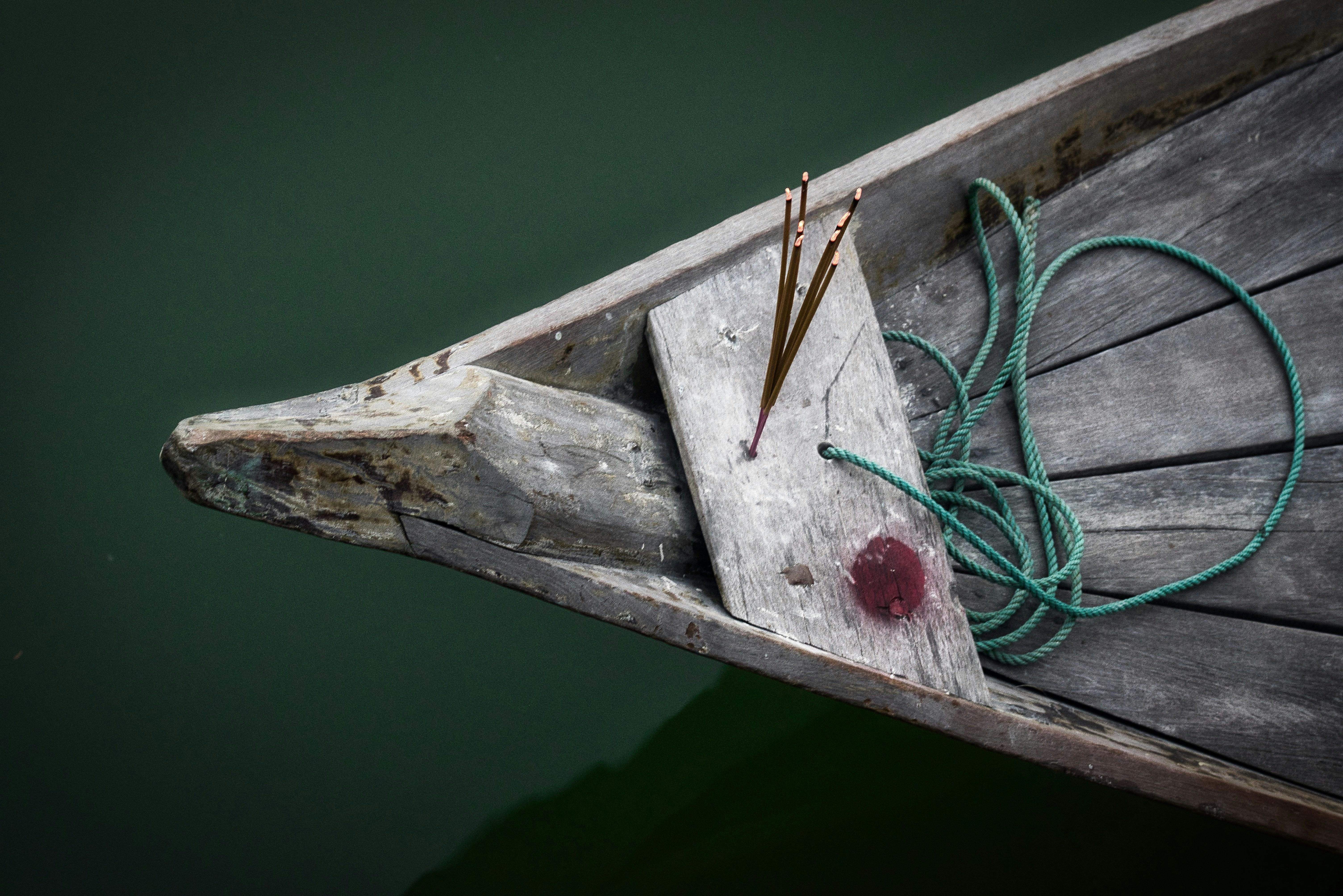 Nails and Rope on Weathered Bow: A Quiet Corner of the Dock
