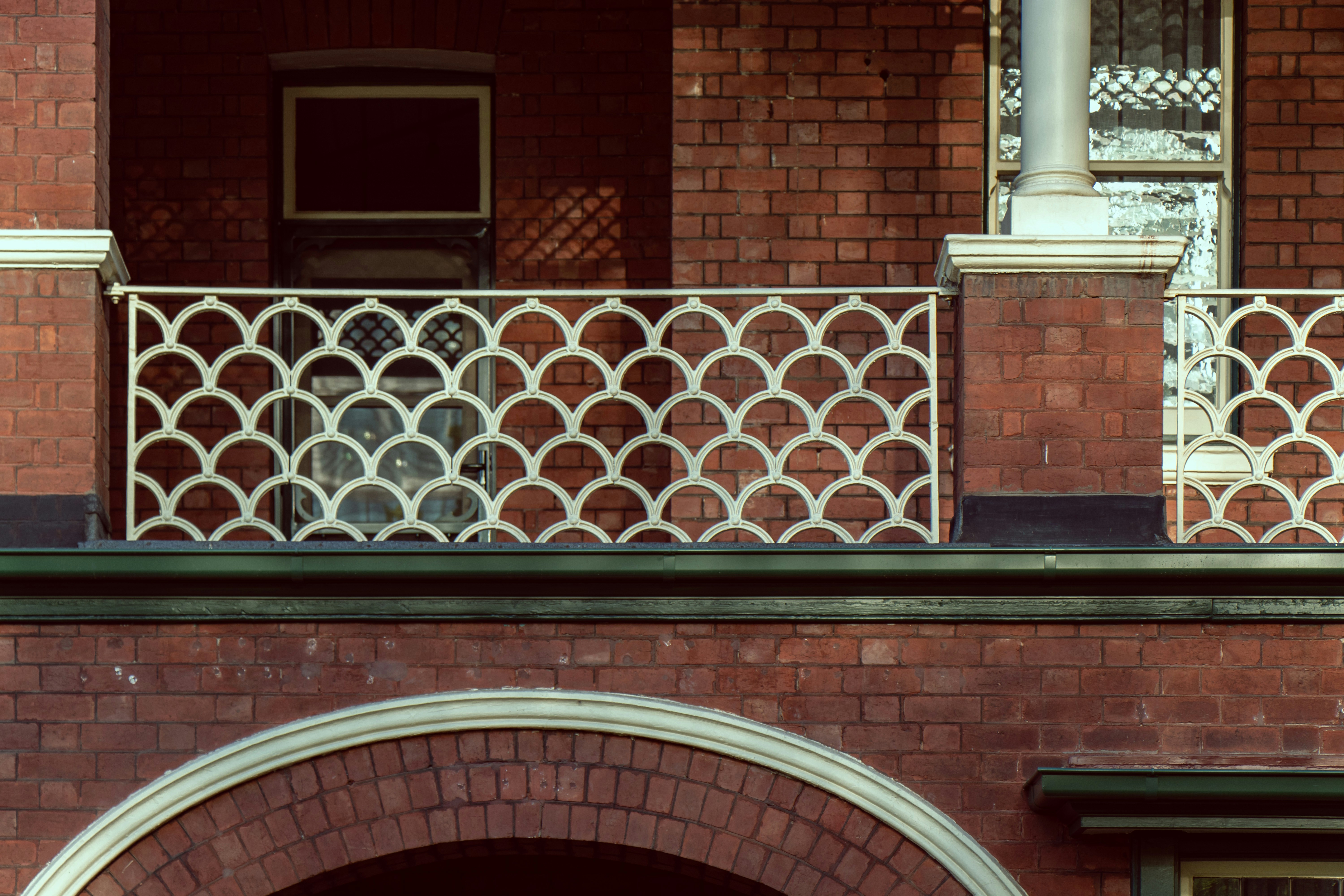 Brick Lace and Arch: Geometry on a Quiet Urban Façade
