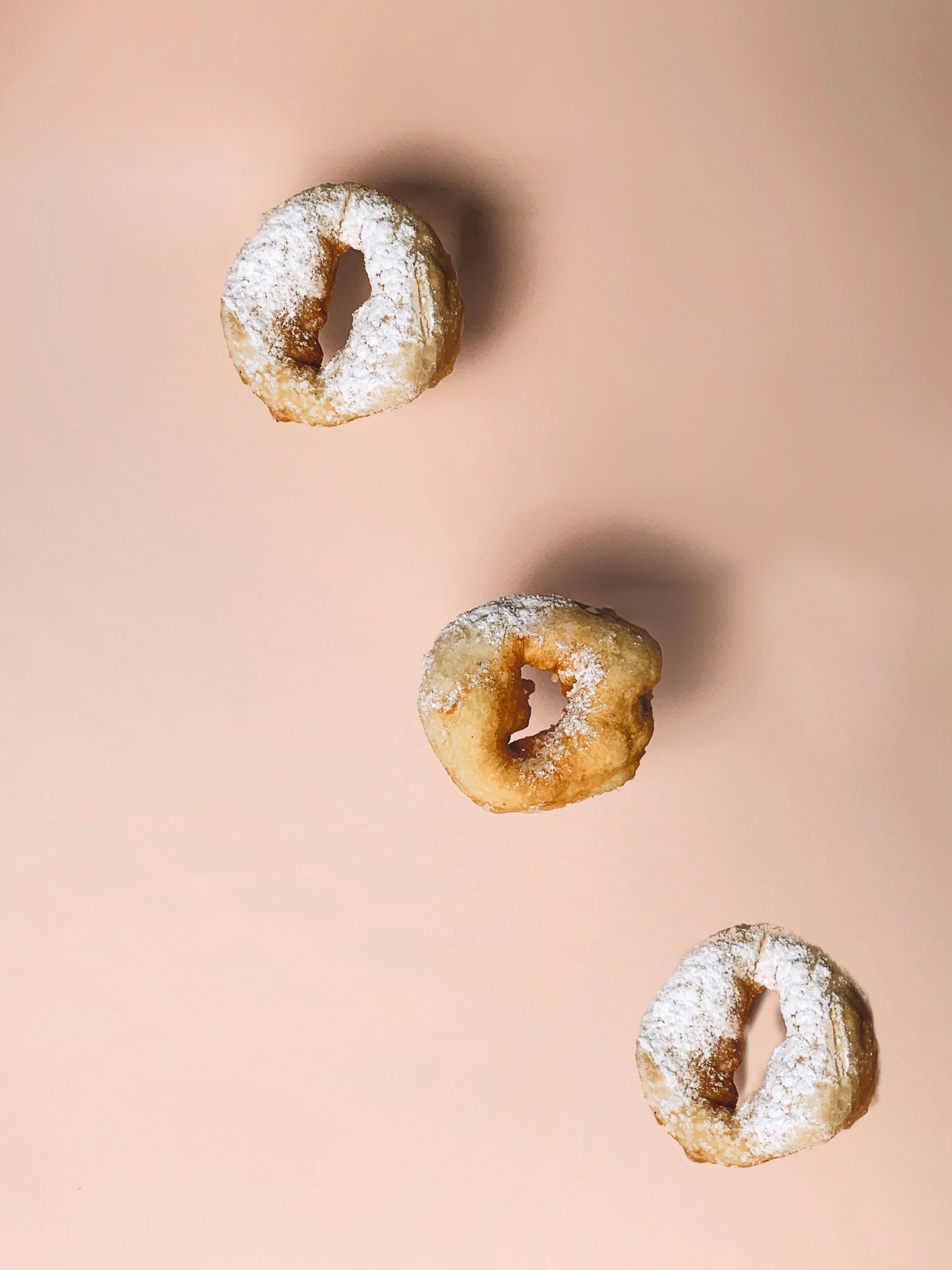 White doughnut on brown surface photo – Free Food Image on Unsplash