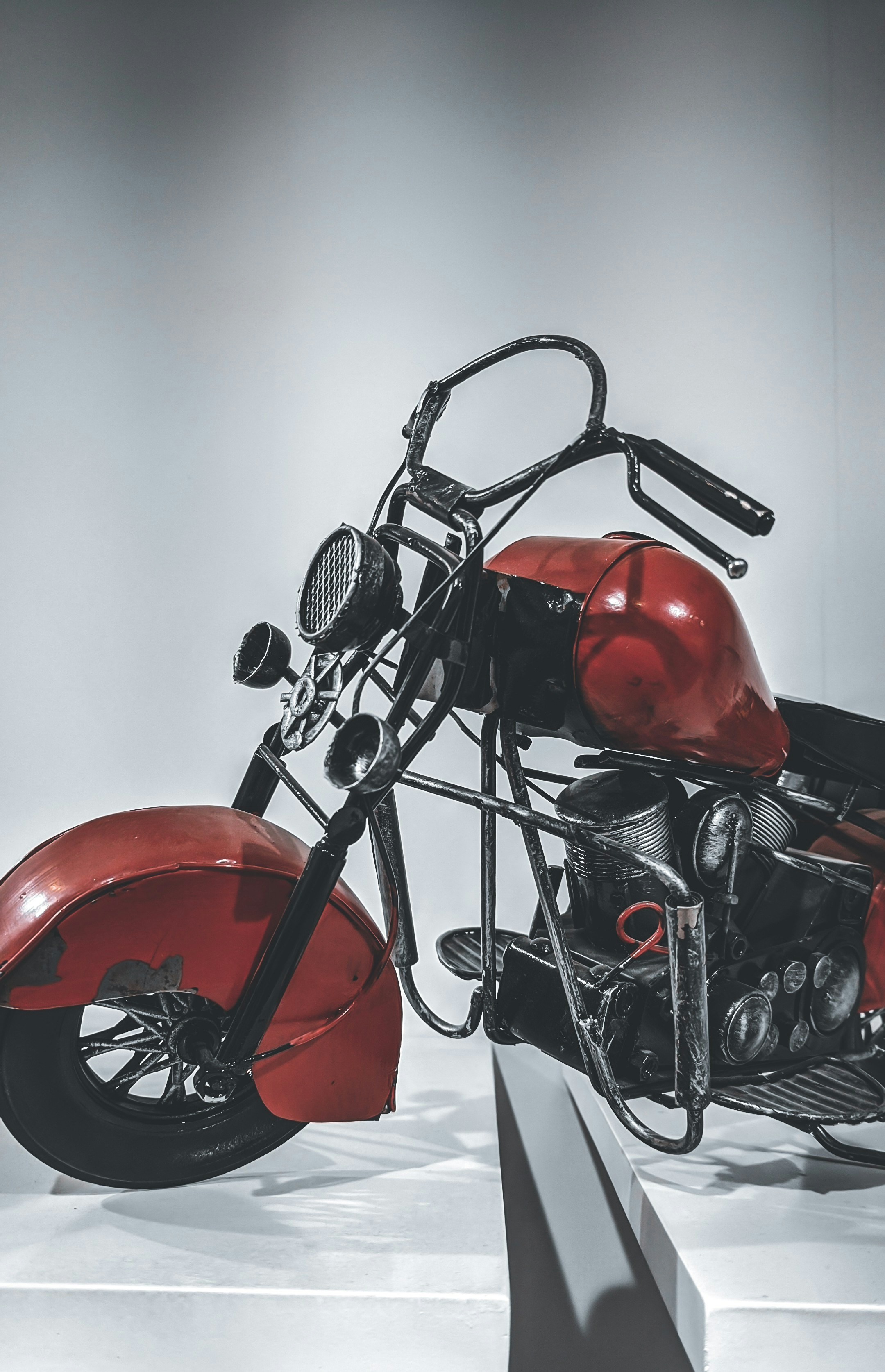 Crimson Chrome Lean: A Vintage Motorcycle on Display