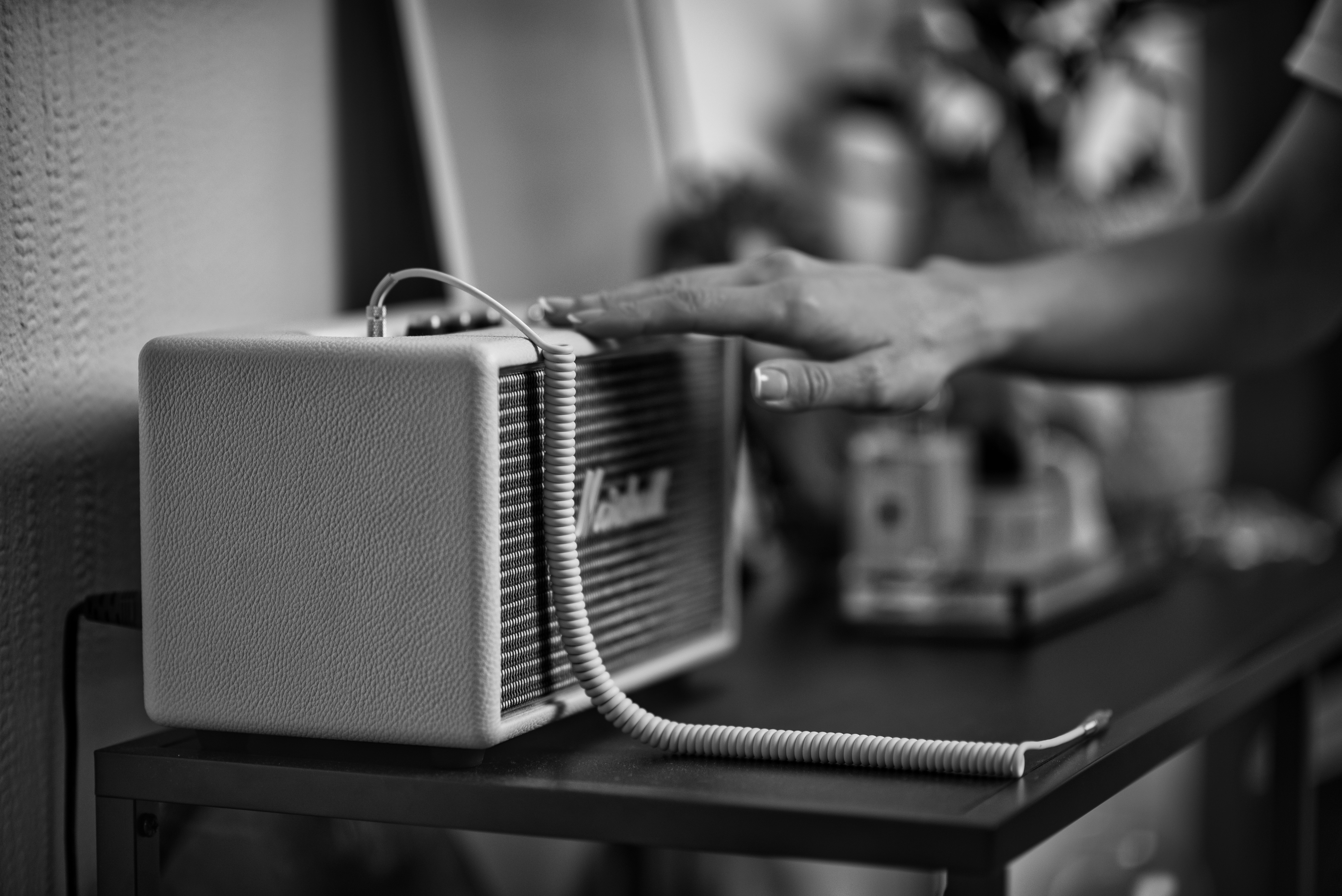 Grayscale photo of person holding radio photo – Free Grey Image on Unsplash