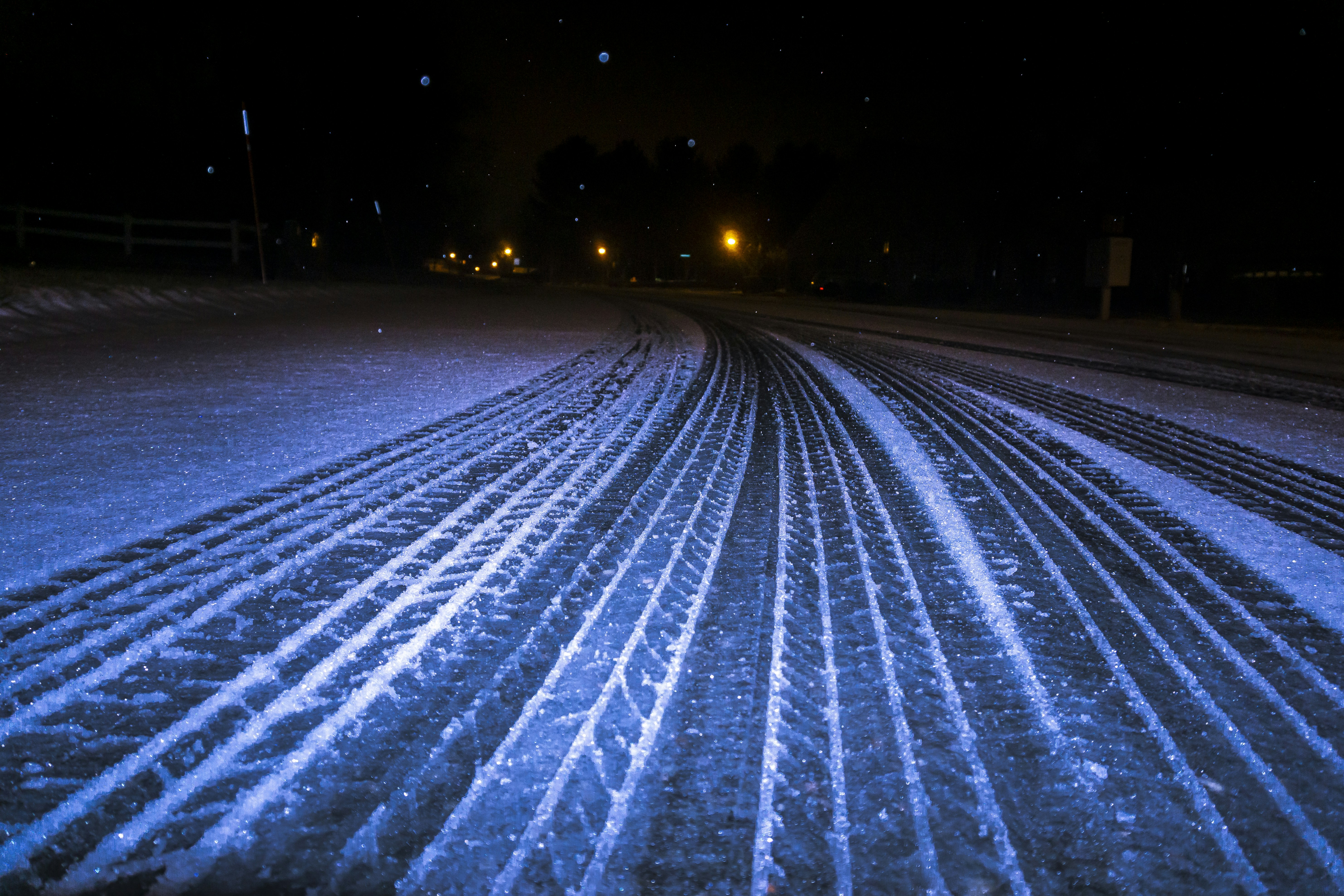 Ridge Tracks: Snow-Curved Lanes Under Night Lights