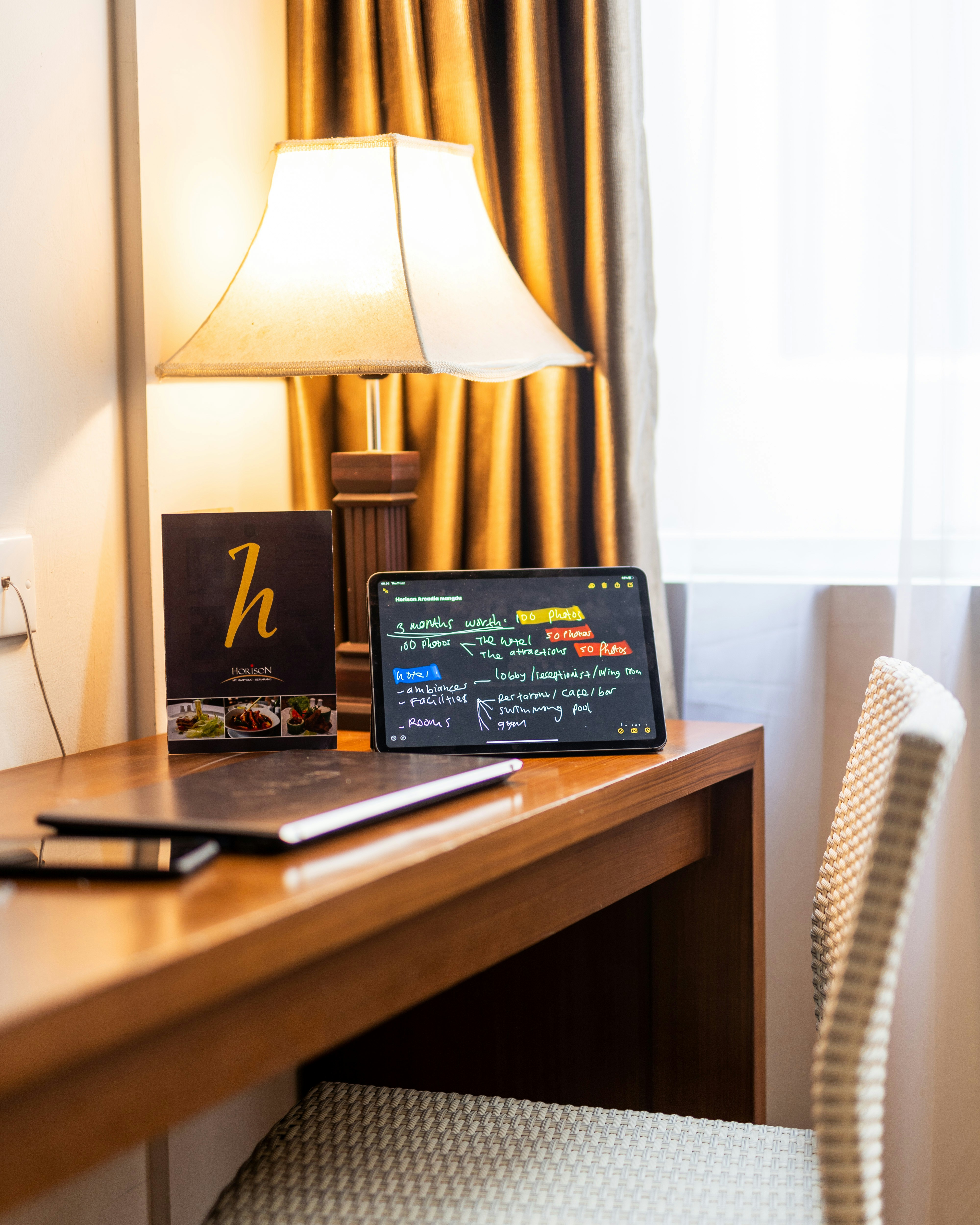 Black laptop computer on brown wooden desk photo – Free Lamp Image on ...
