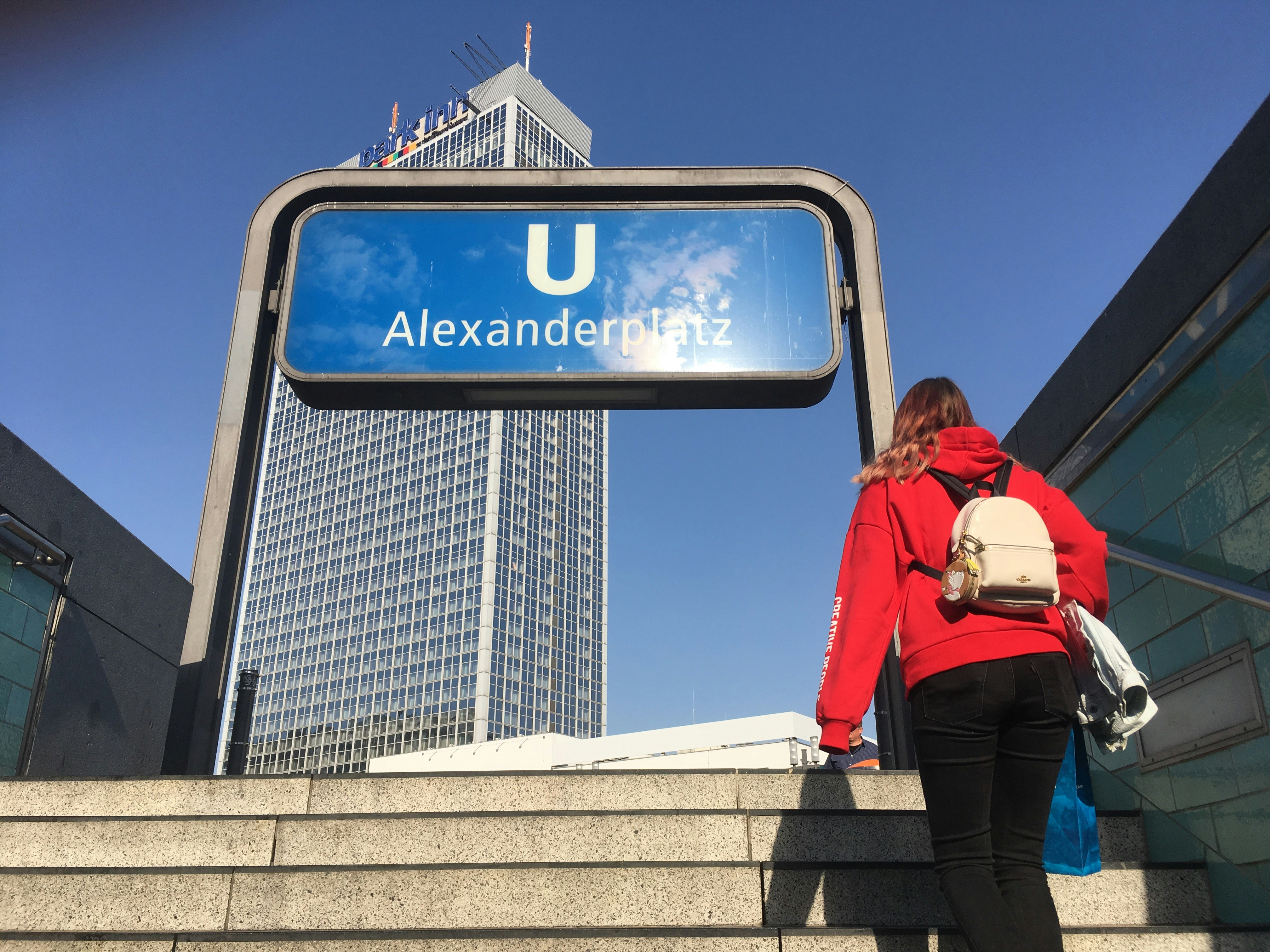 Girl leaving the underground at Alexanderplatz in Berlin.