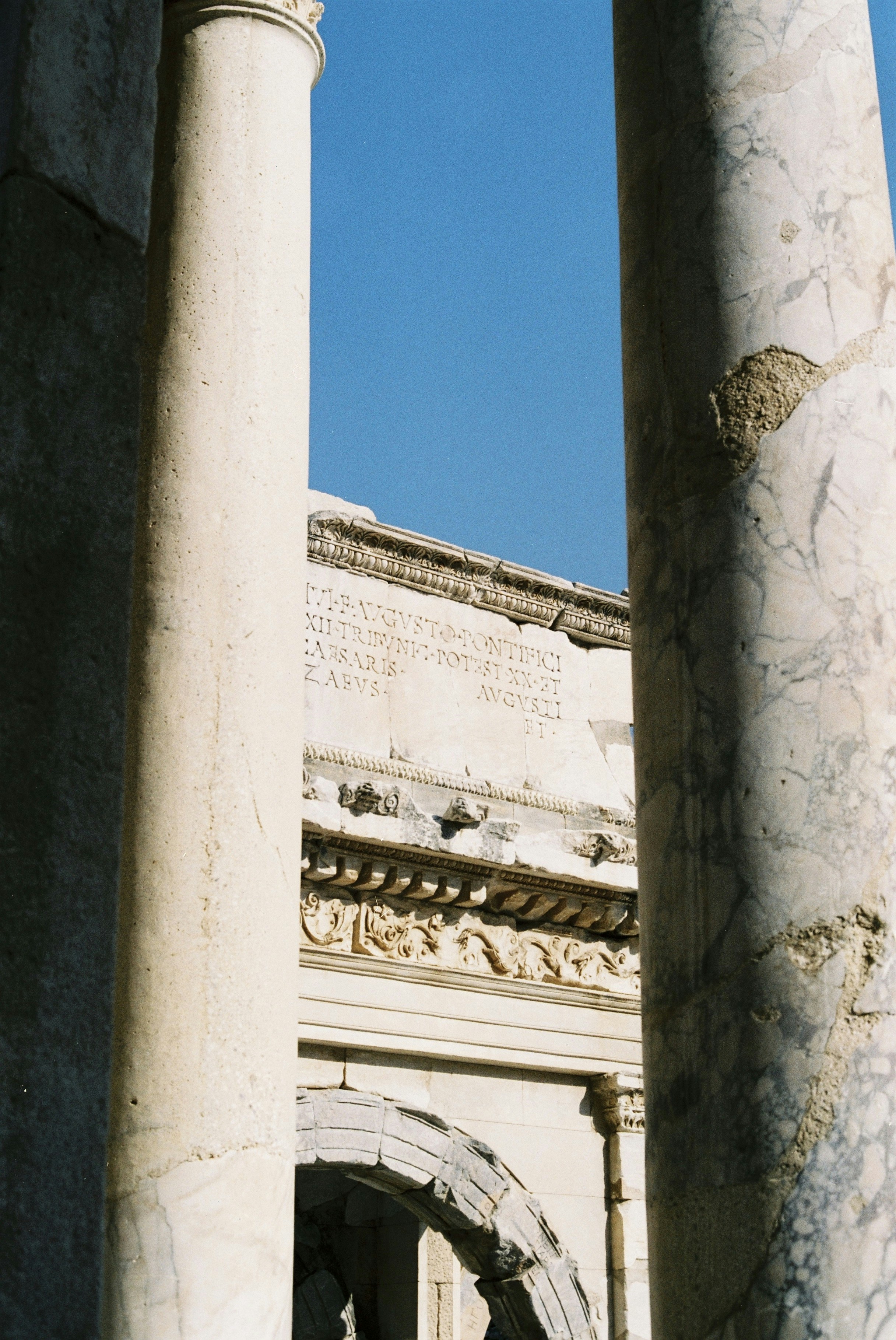 white concrete pillar under blue sky during daytime