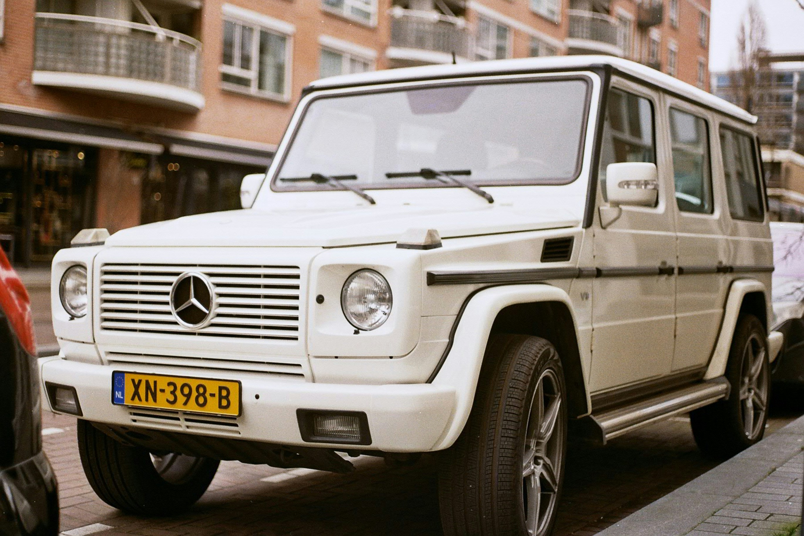 White mercedes benz g class on road during daytime photo – Free Shot on ...